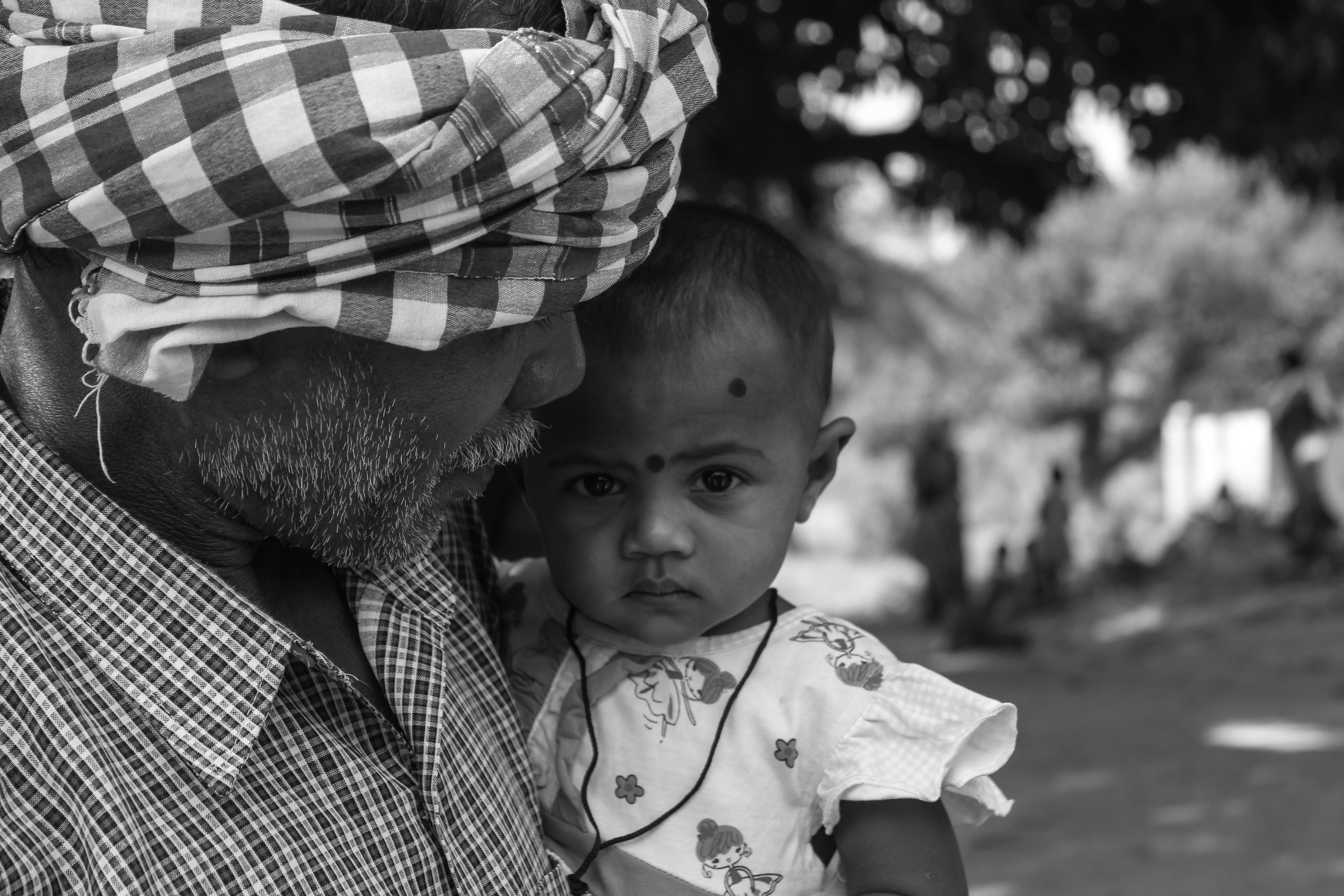 Father in Turban Holding Child · Free Stock Photo