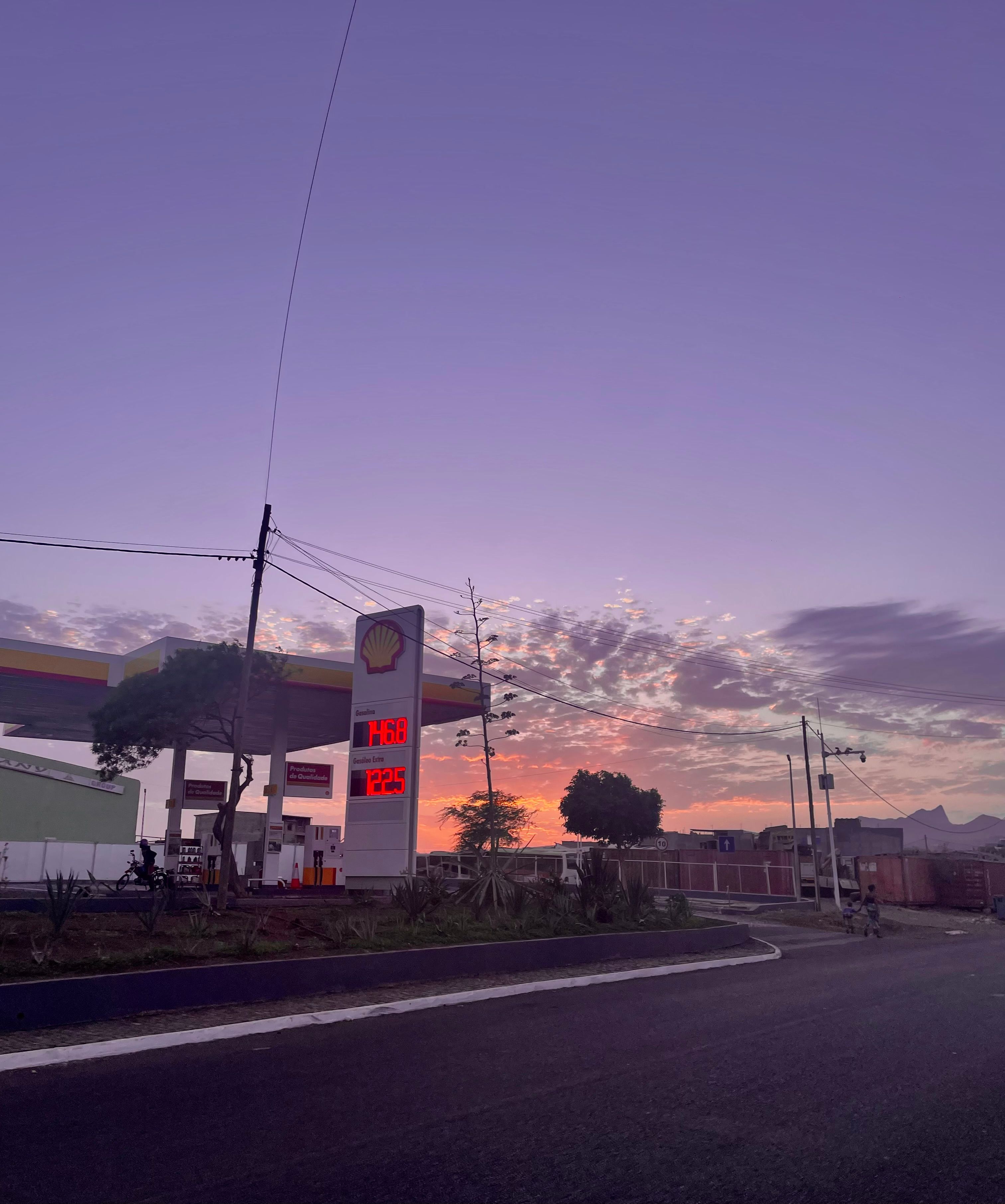 Gas Station in Town at Sunset · Free Stock Photo
