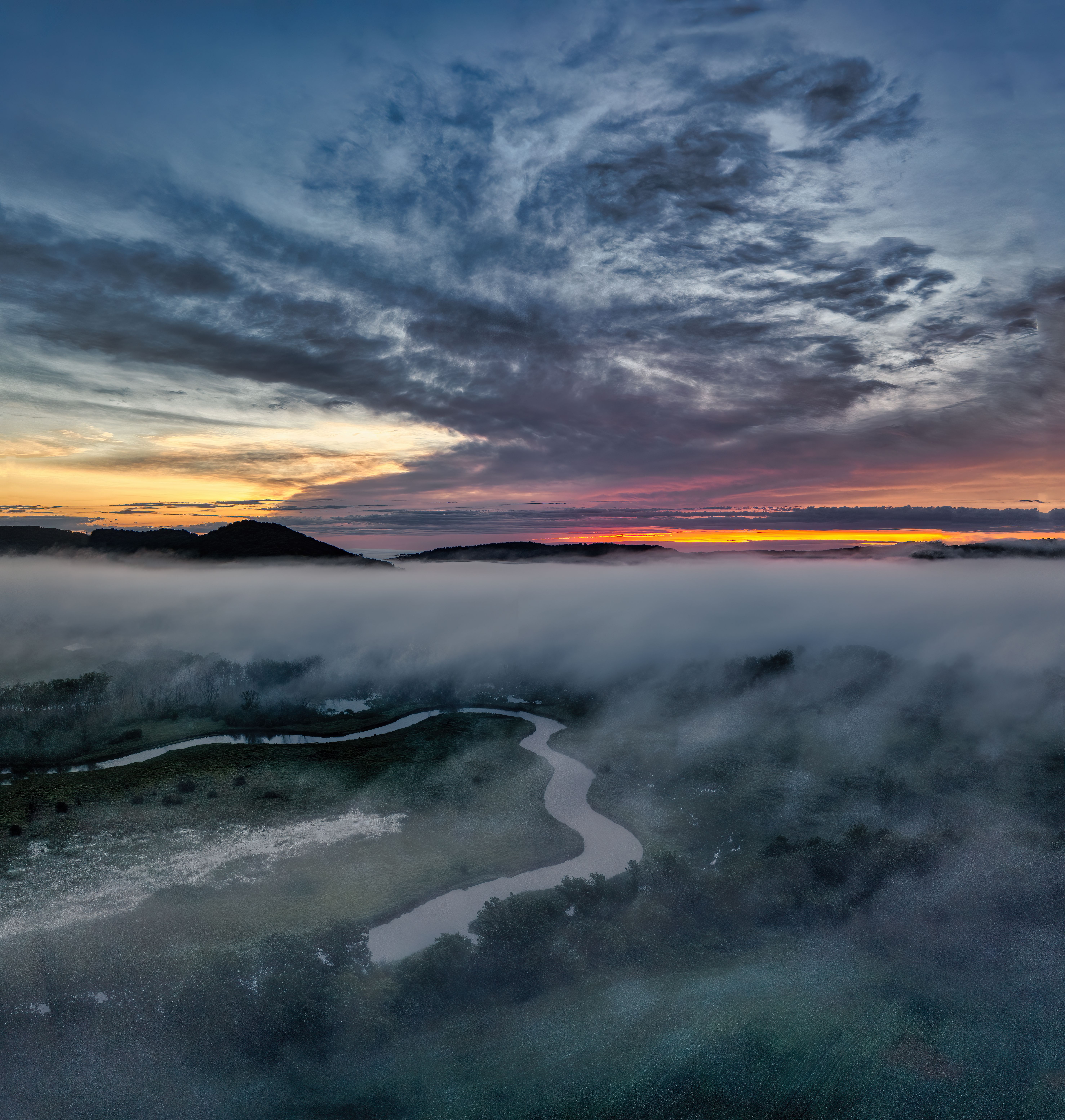 Aerial View of a River and Mountains in the Horizon · Free Stock Photo