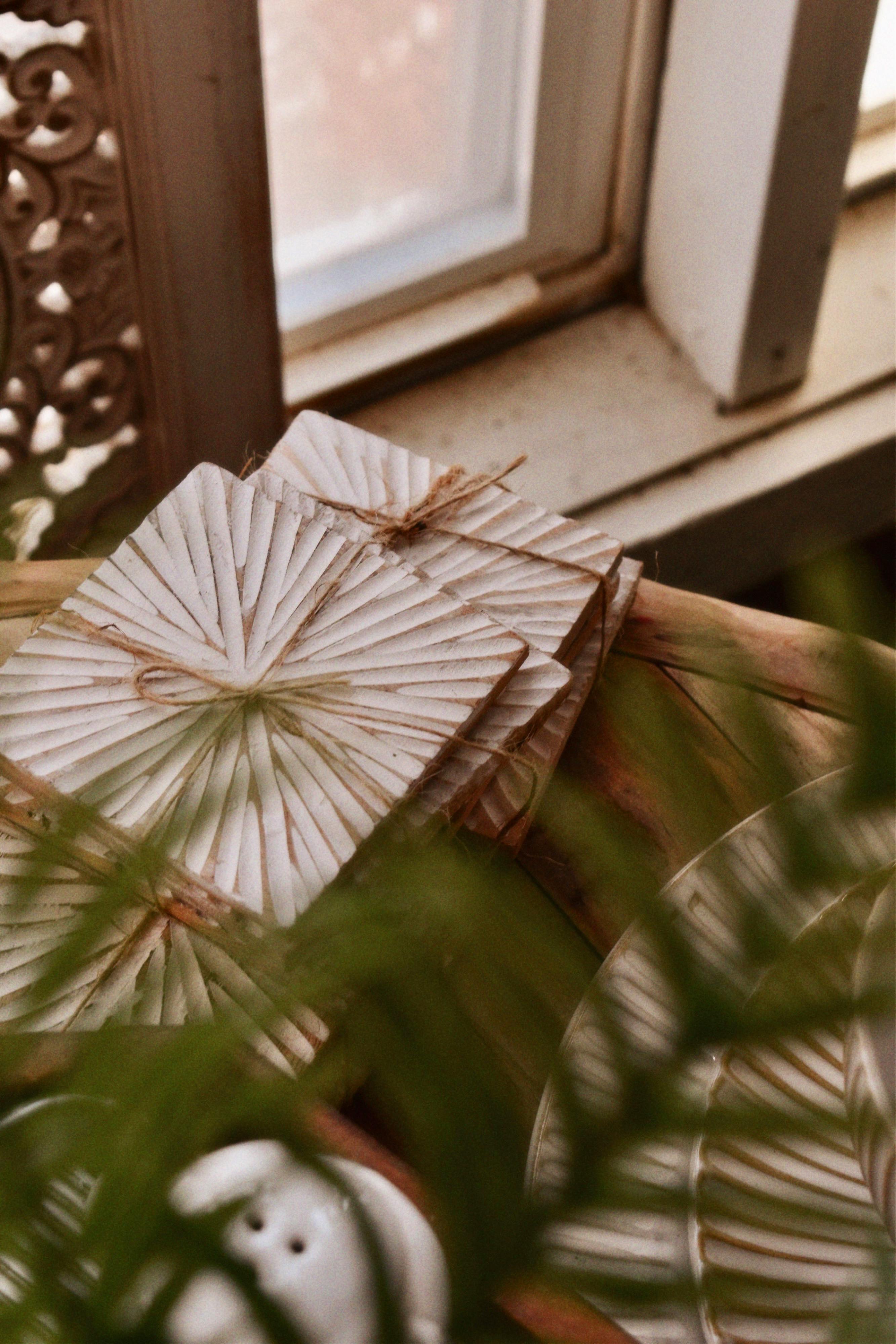 Boxes Tied with Strings behind Leaves · Free Stock Photo