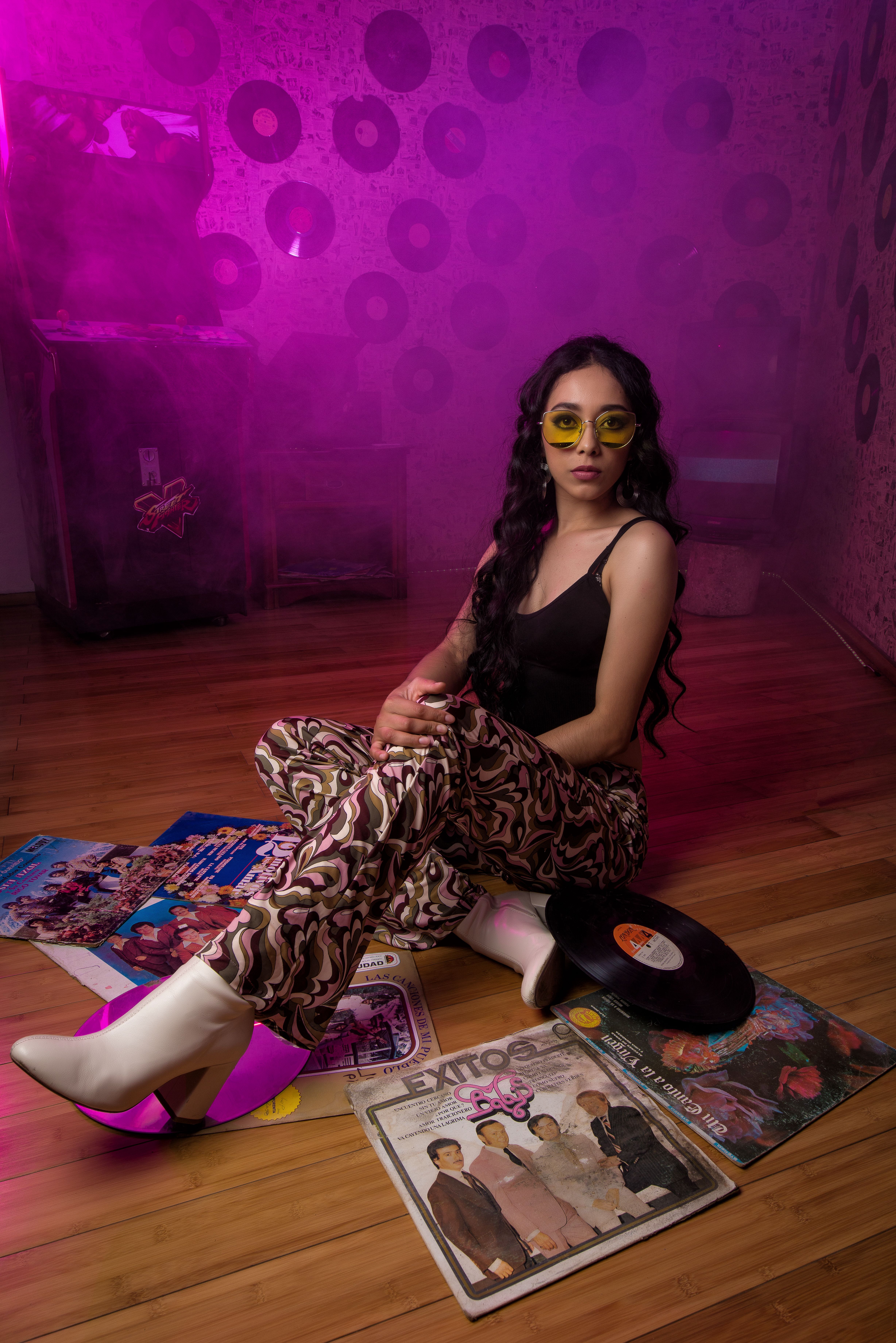 Woman Sitting on the Floor among Scattered Vinyl Records · Free Stock Photo