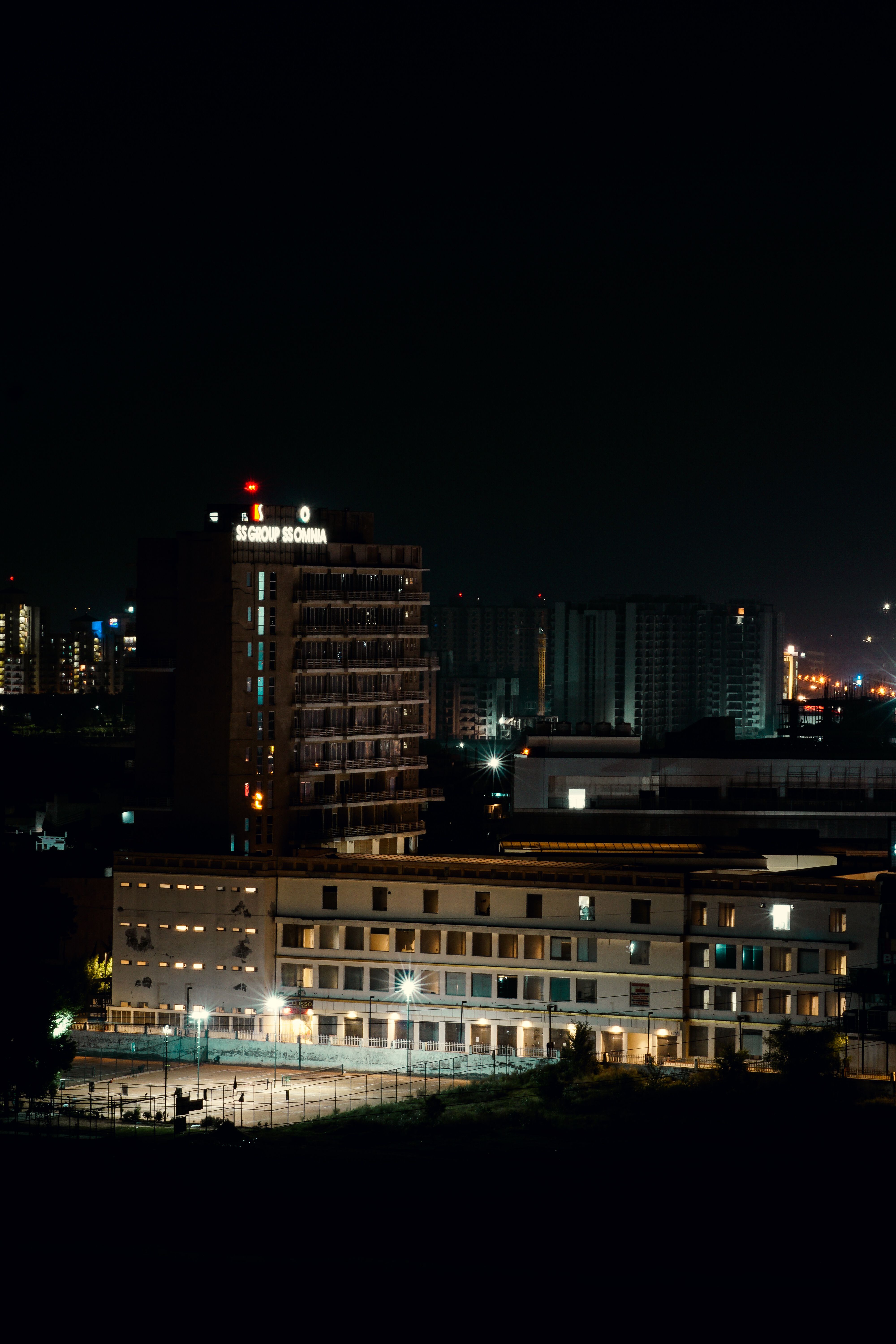 School Building Illuminated at Night · Free Stock Photo