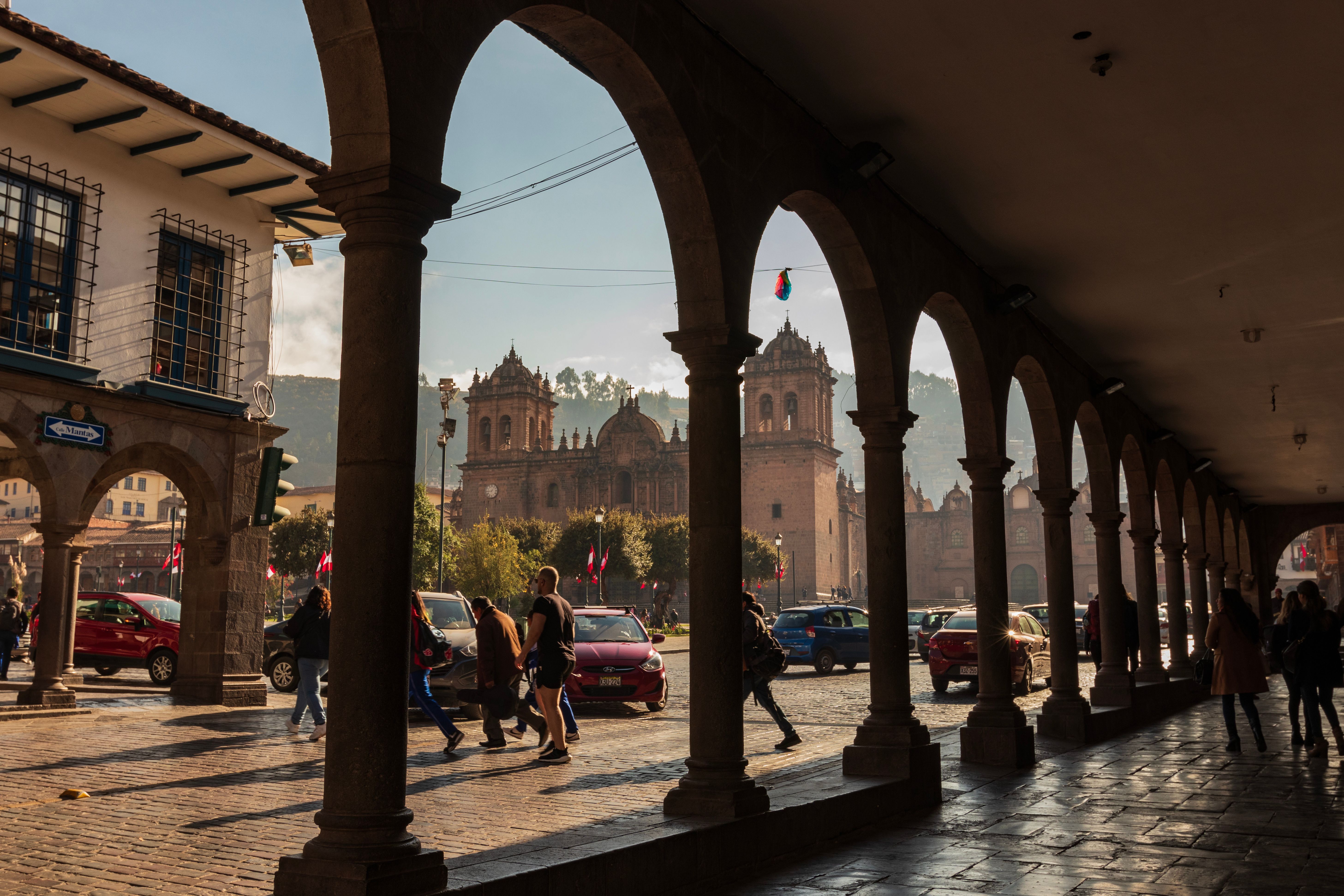 People and Cars on Street in Cuzco · Free Stock Photo