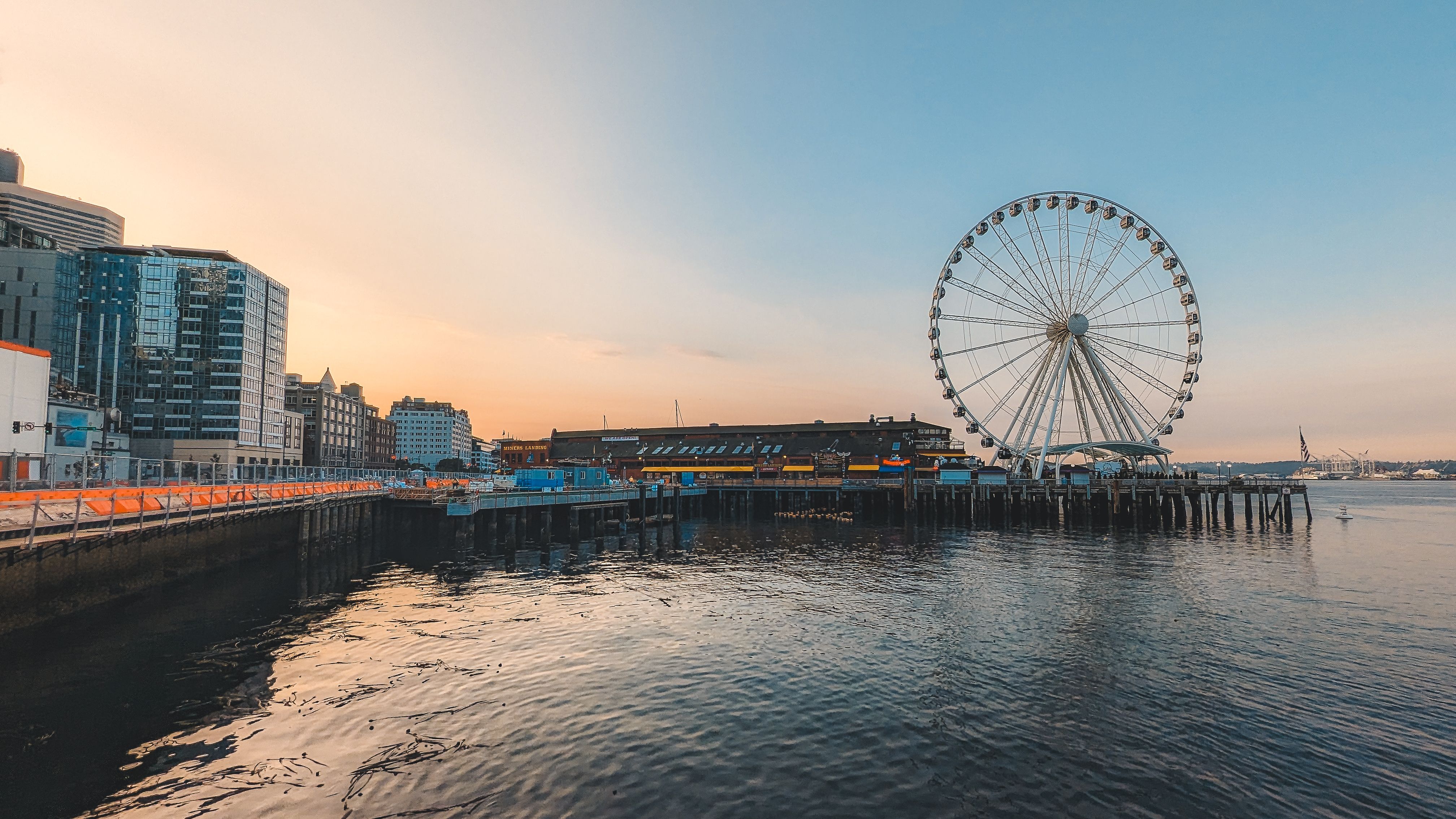 Ferris Wheel on Sea Shore at Sunset · Free Stock Photo