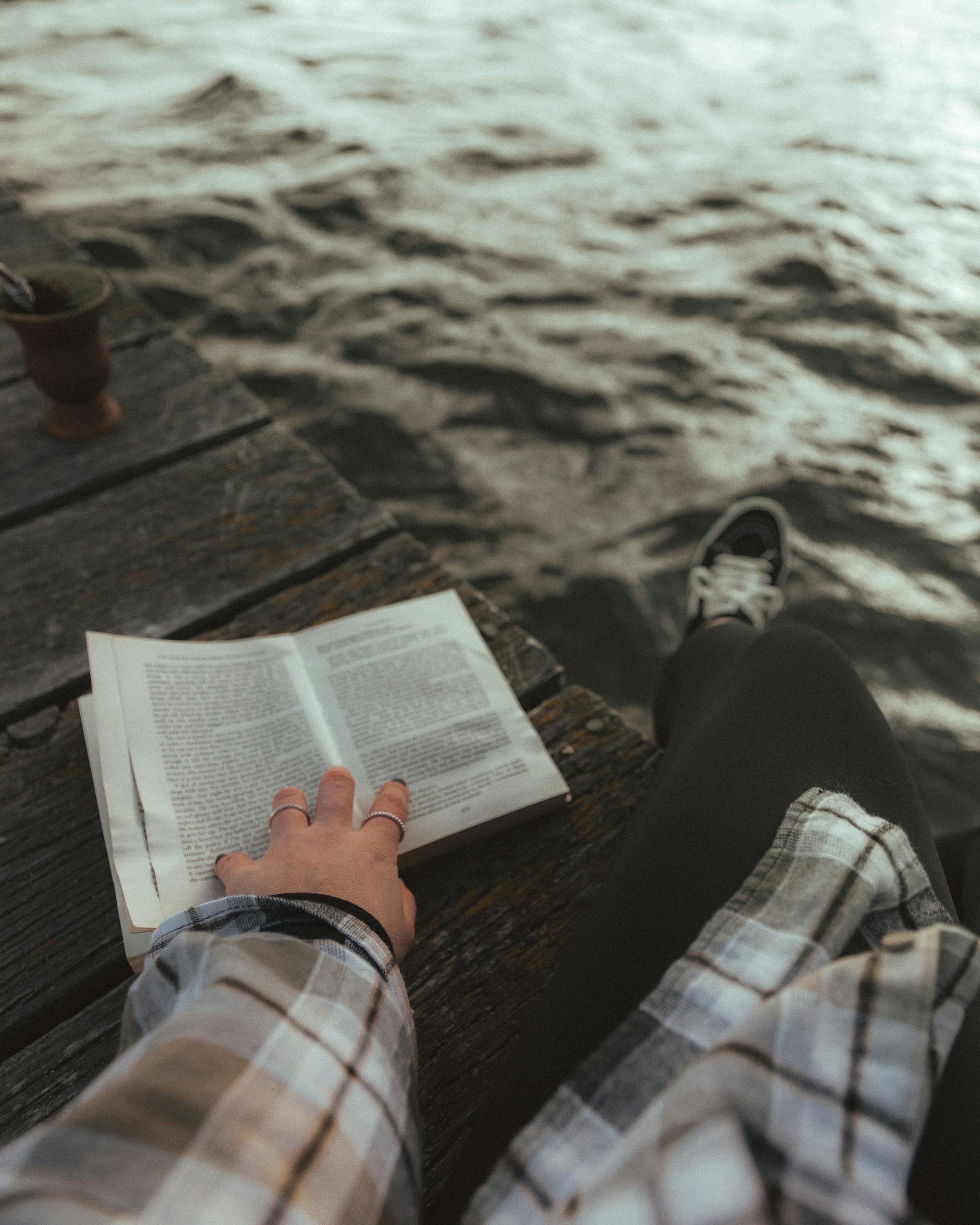 Reading & Chillin' by the lake. · Free Stock Photo