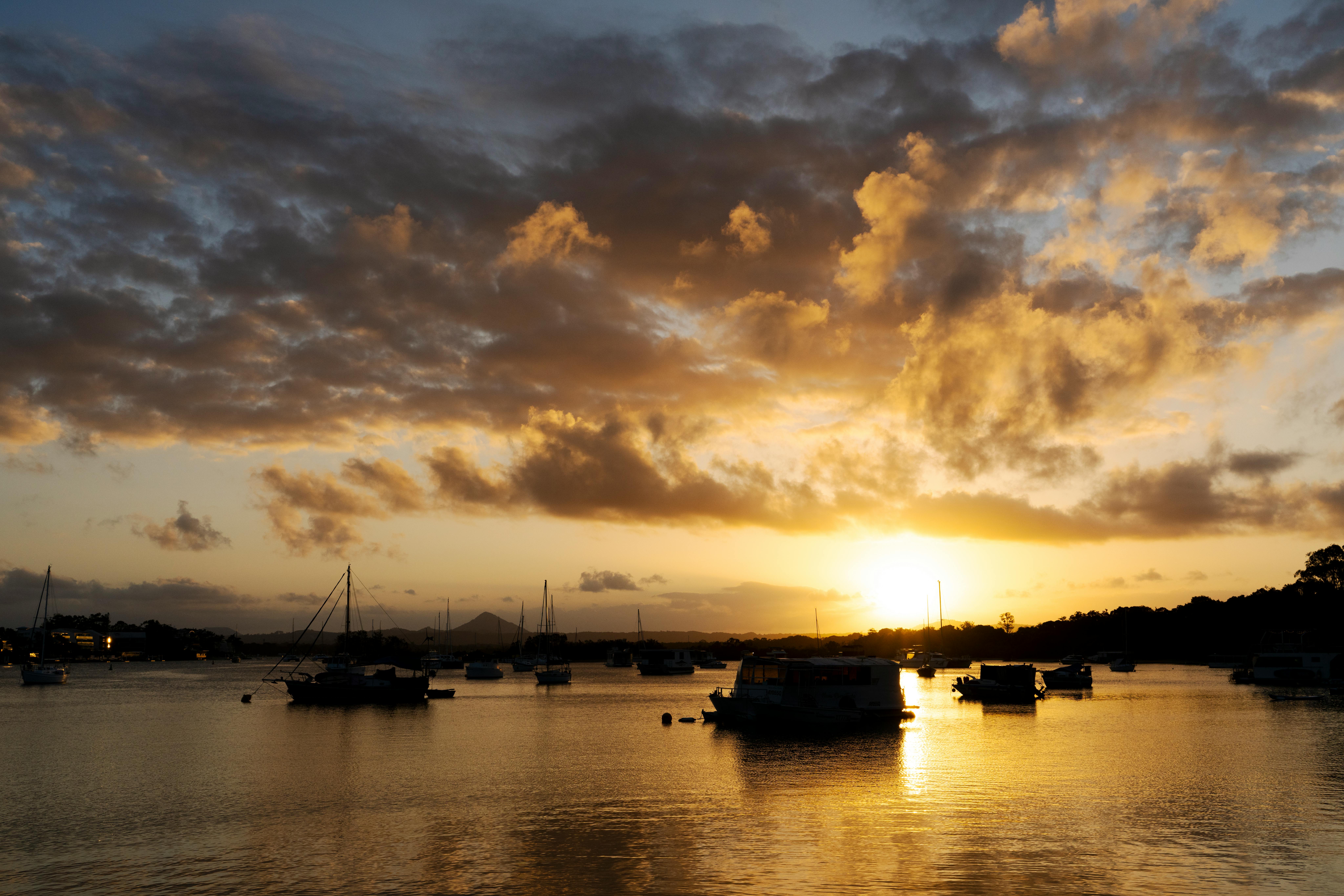 Silhouette of Boat on Sea during Sunset · Free Stock Photo
