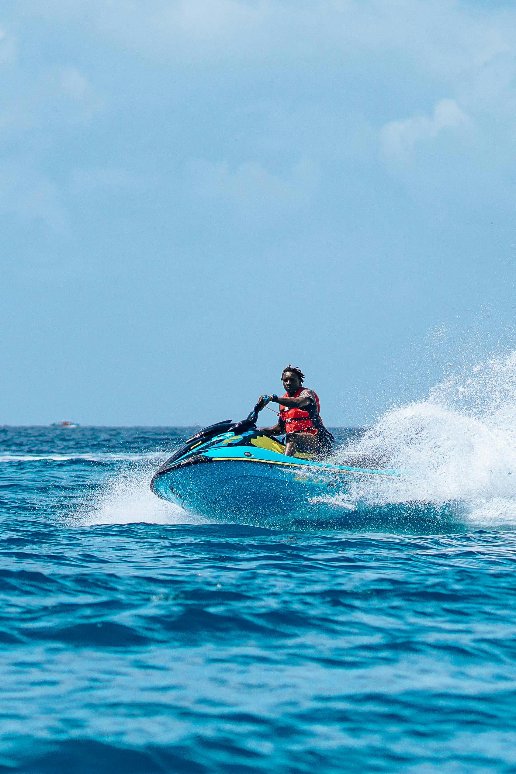 Man Riding Jet Ski · Free Stock Photo