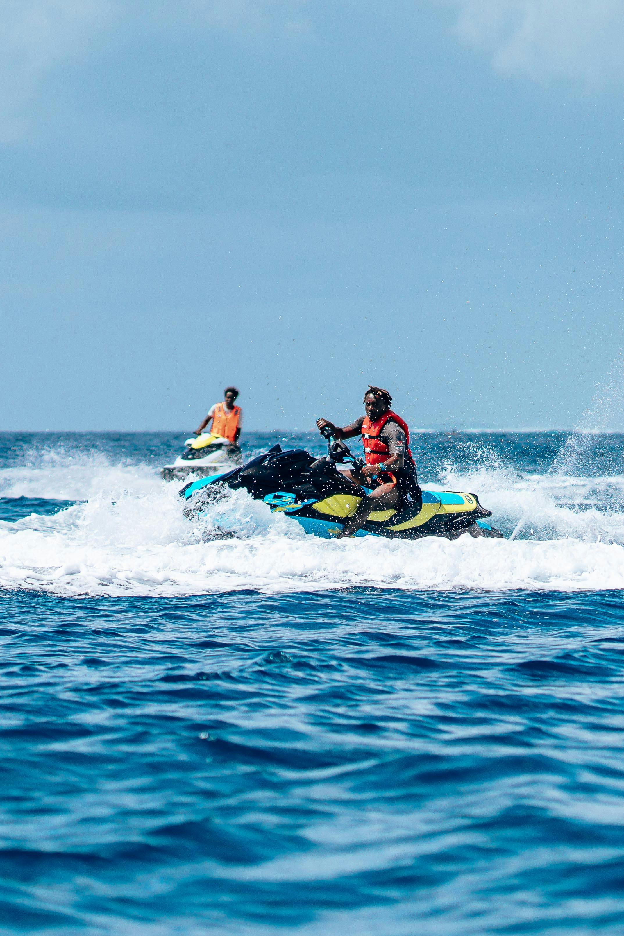 People Riding A Jet Ski · Free Stock Photo