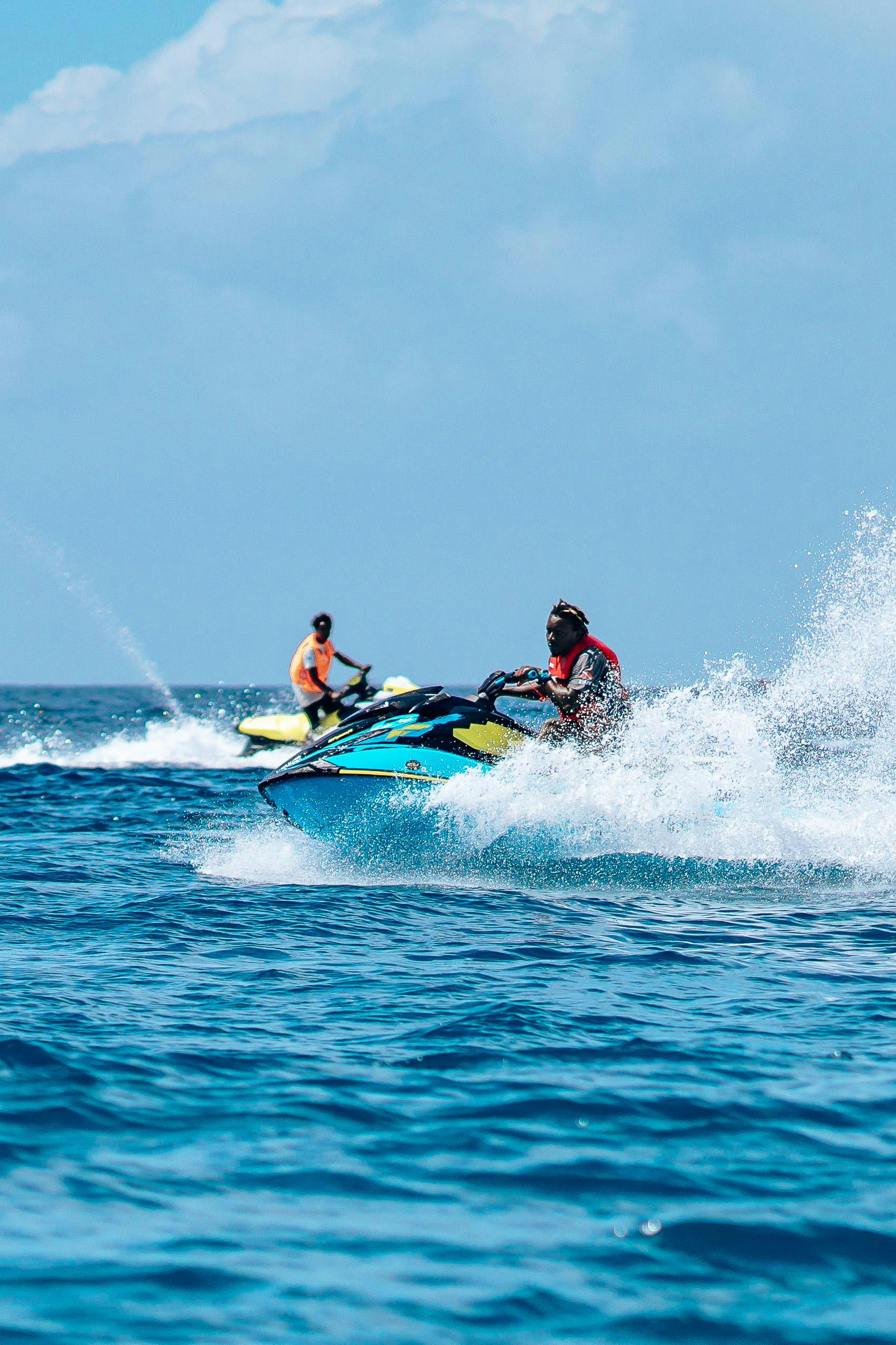 People Riding Jet Ski · Free Stock Photo