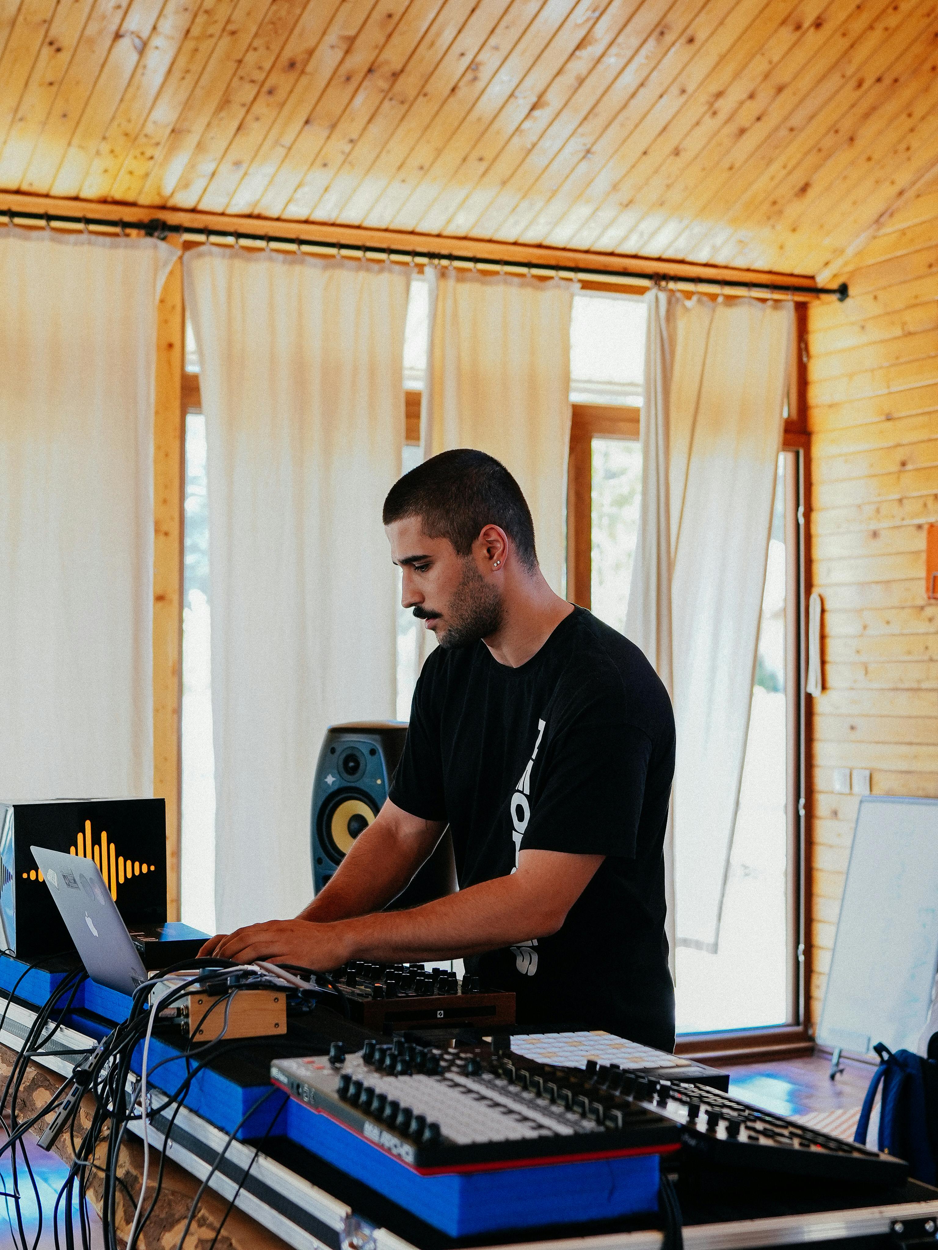 DJ Standing and Working · Free Stock Photo