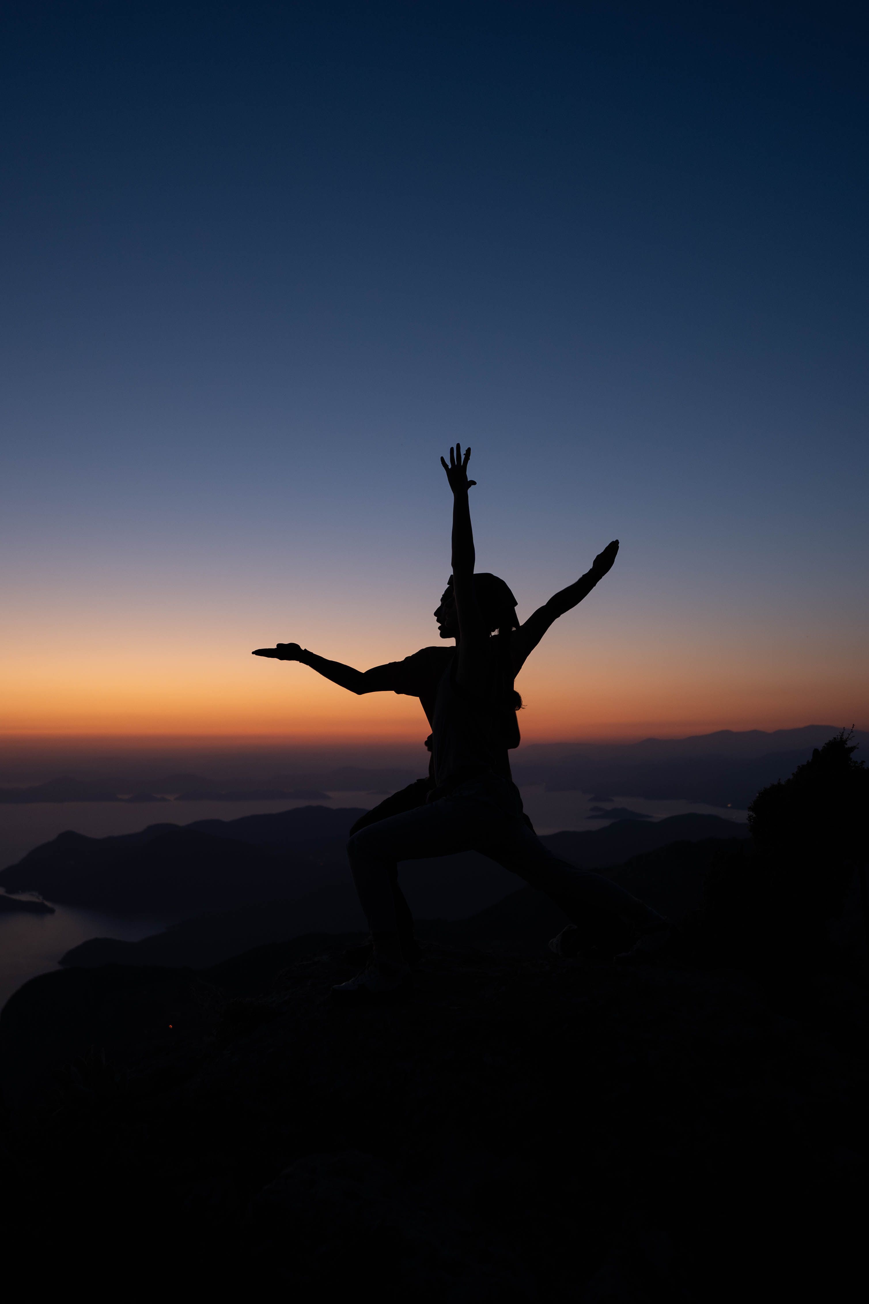 Silhouette of Models Posing at Sunset · Free Stock Photo
