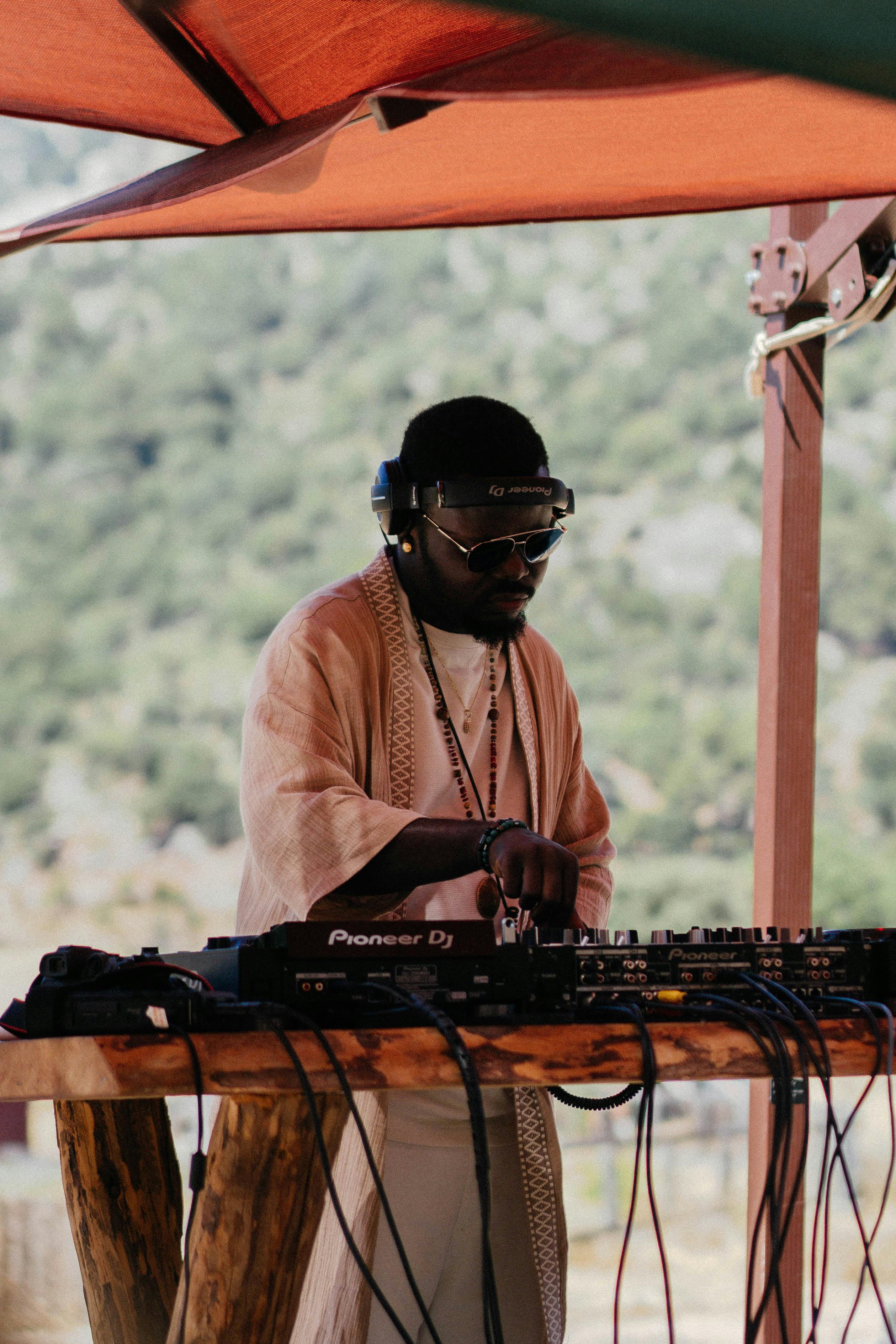 Photo of a DJ Wearing Headphones · Free Stock Photo