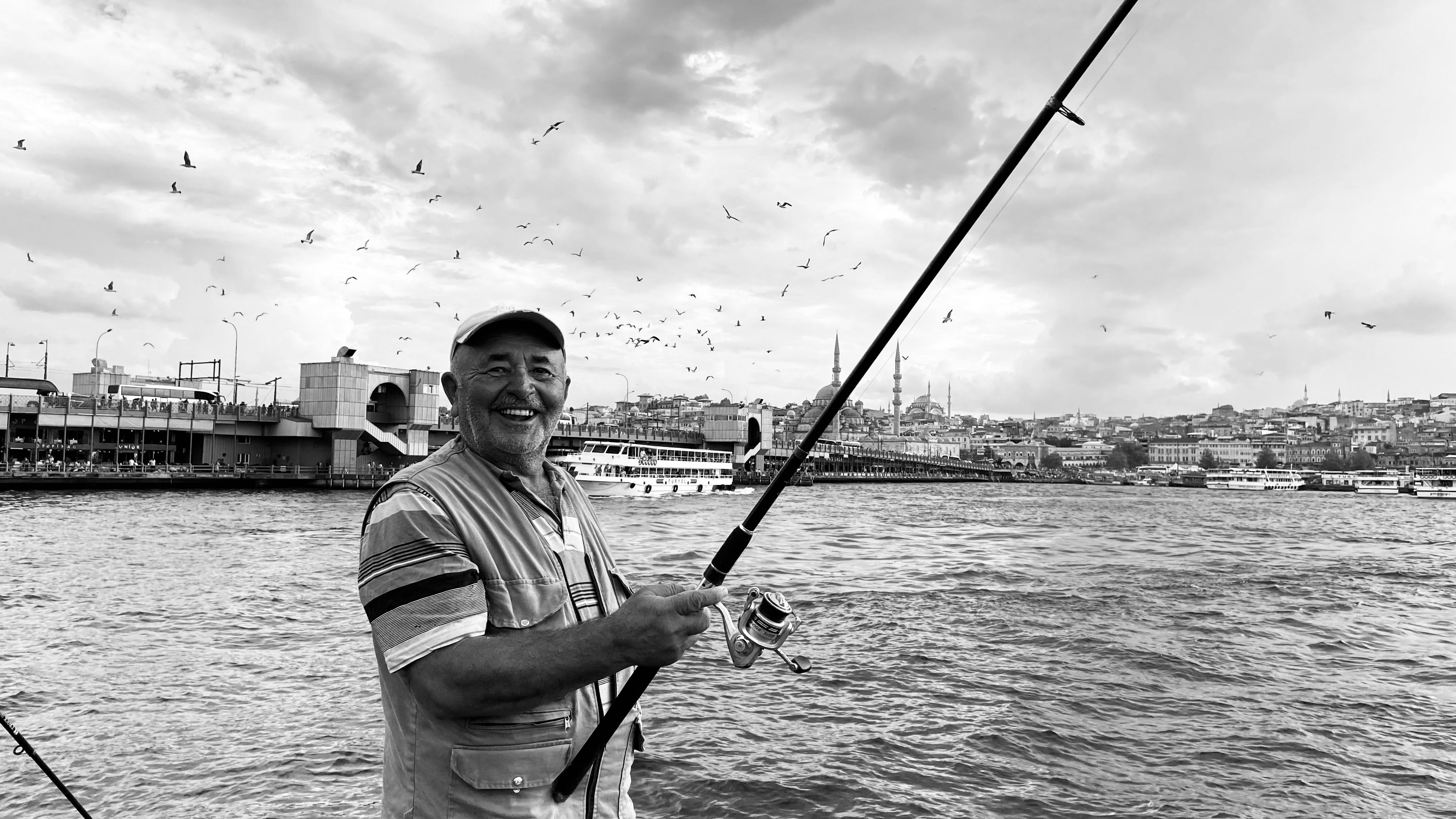 Smiling Fisherman on Sea Shore in Istanbul · Free Stock Photo