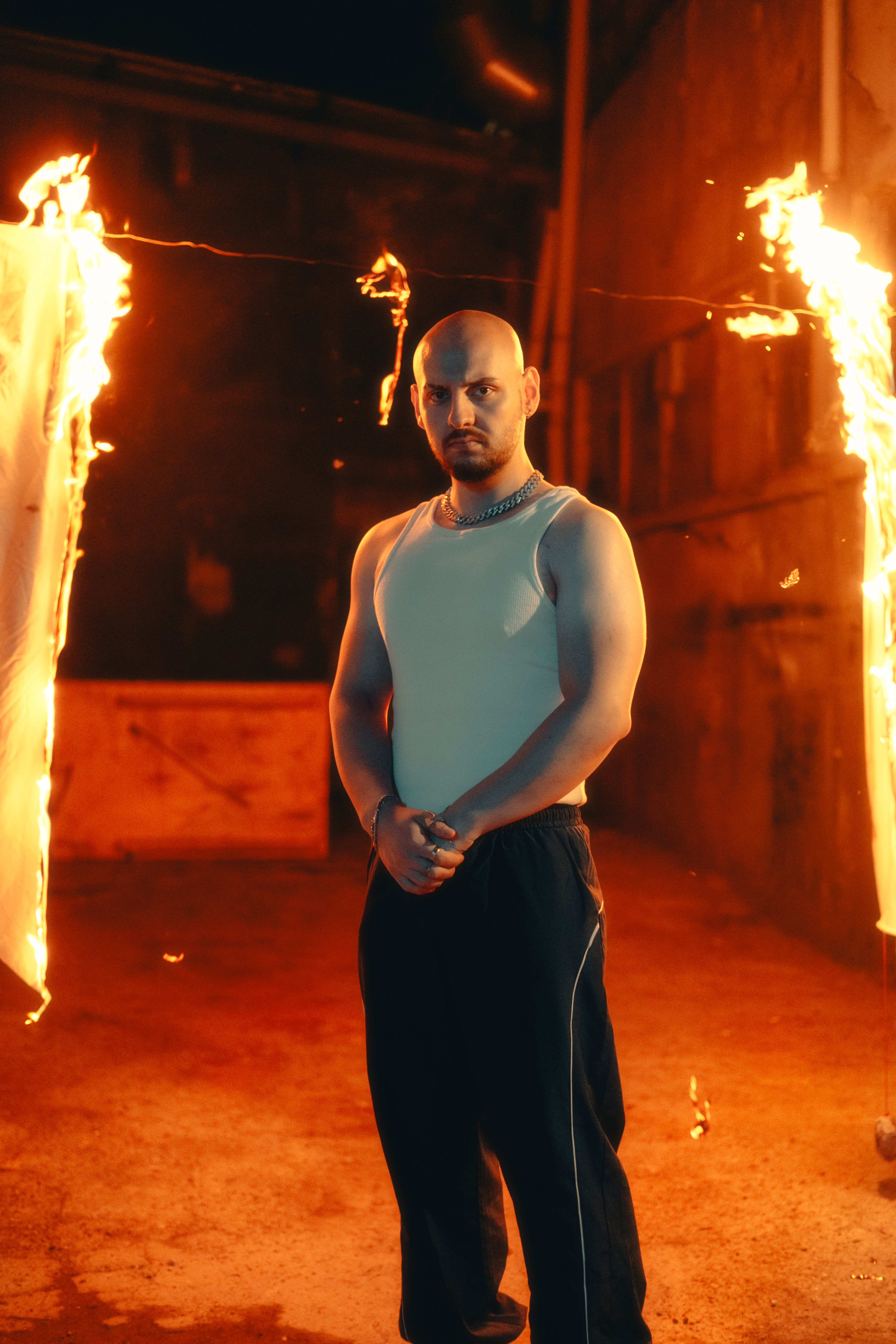 Man Standing near Fire at Night · Free Stock Photo
