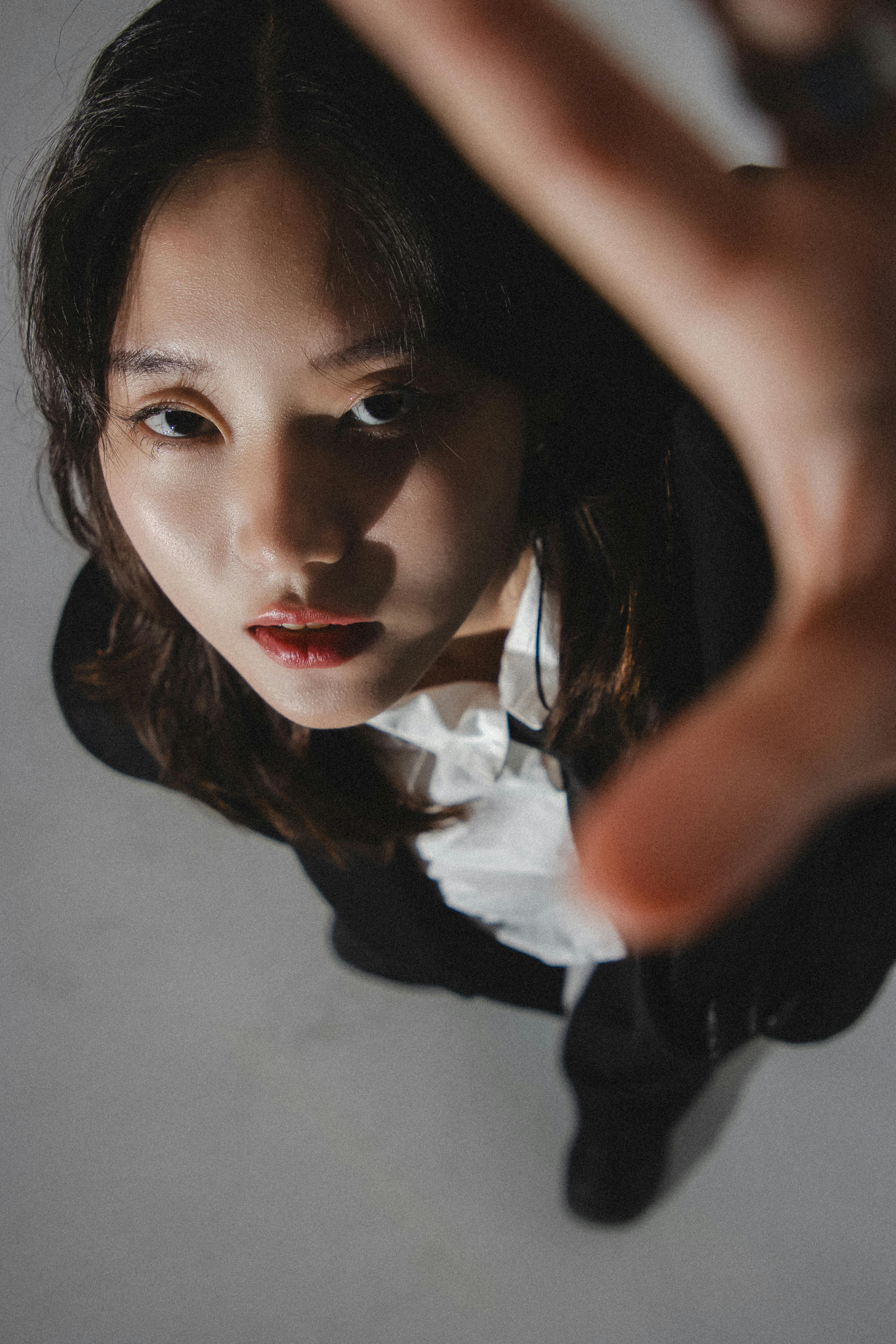 Model Standing and Looking Up · Free Stock Photo