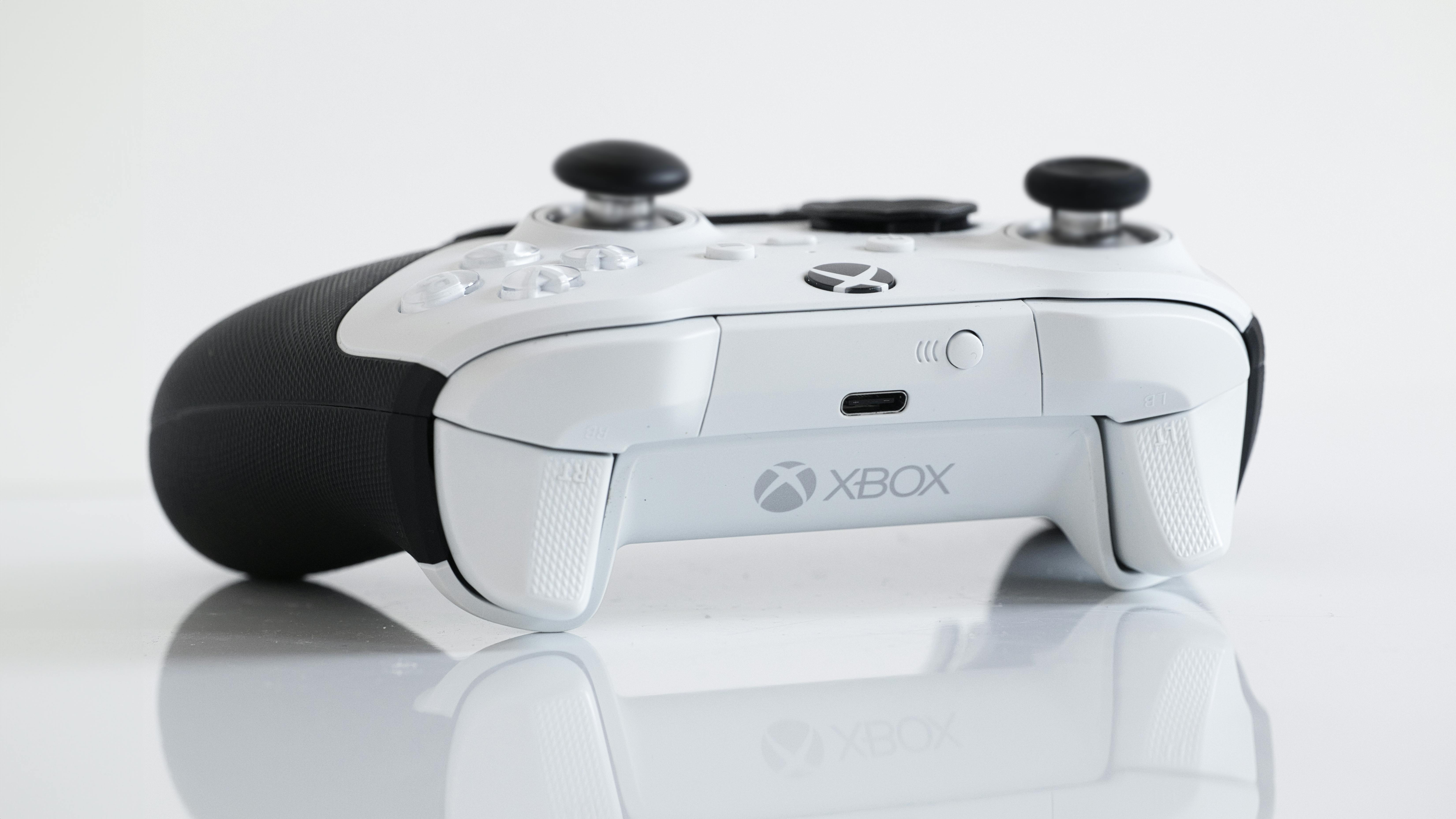 Black and White Photography of a Game Controller · Free Stock Photo