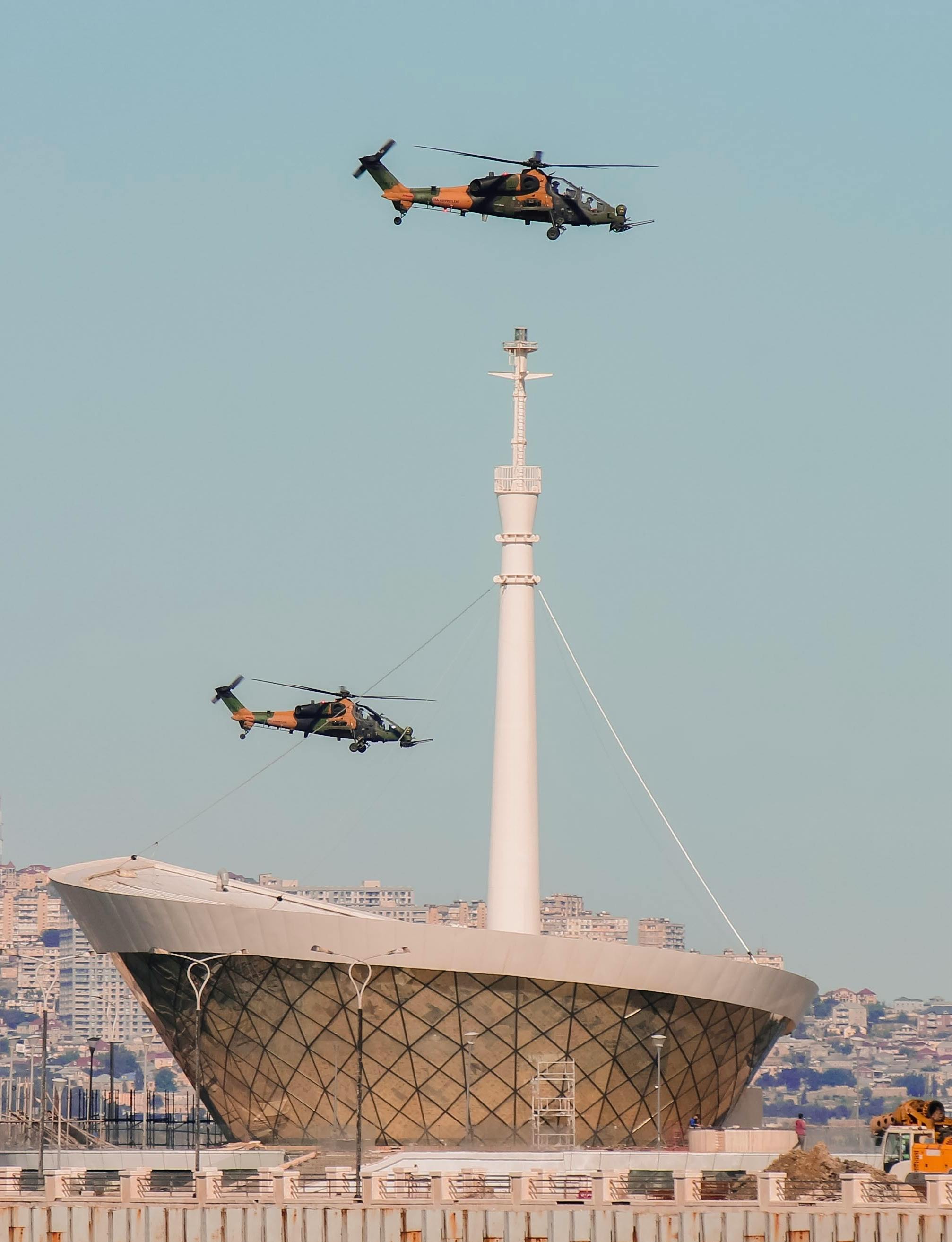 Helicopters Flying over Ruby 360 in Baku · Free Stock Photo