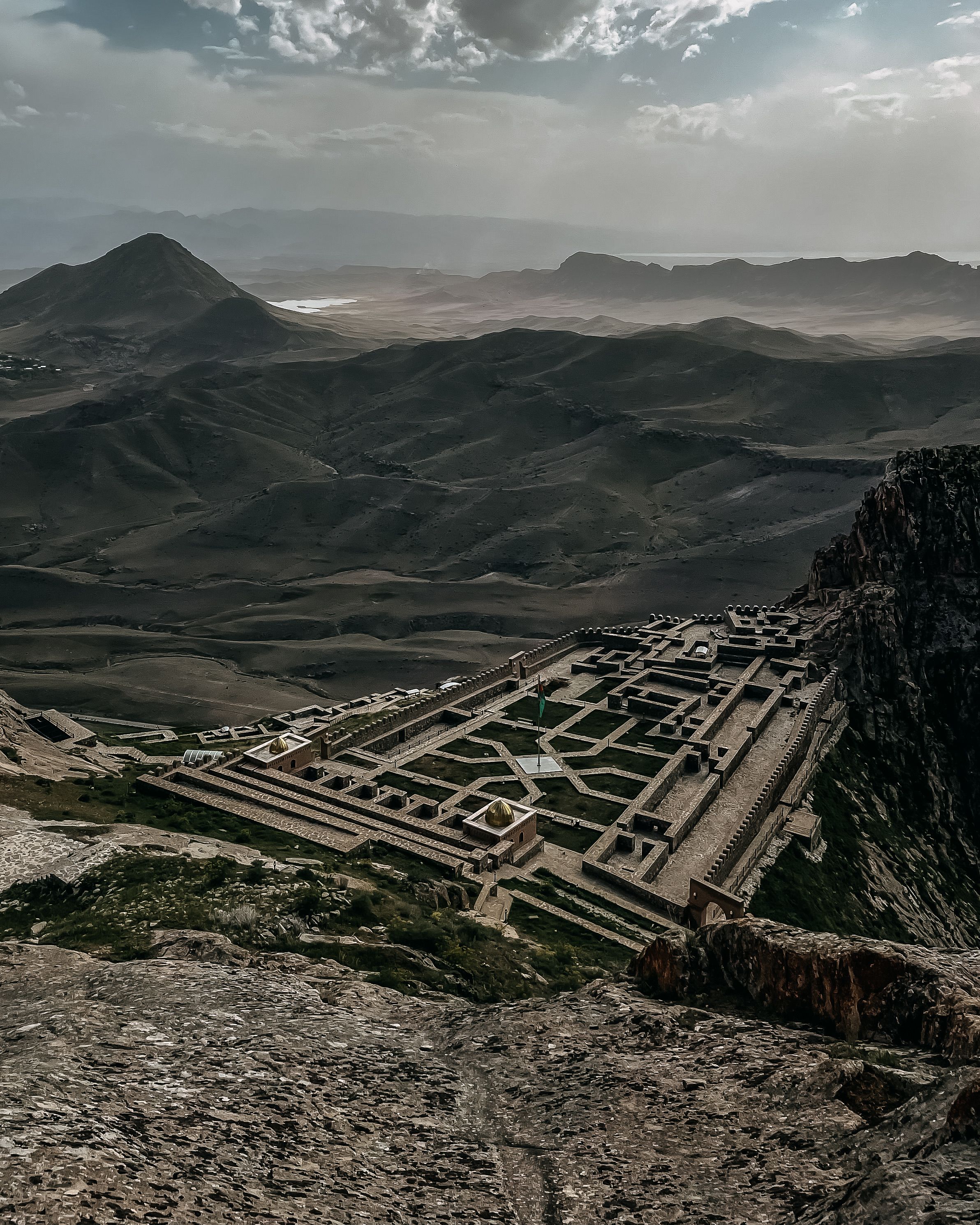 Ancient Building among Hills · Free Stock Photo