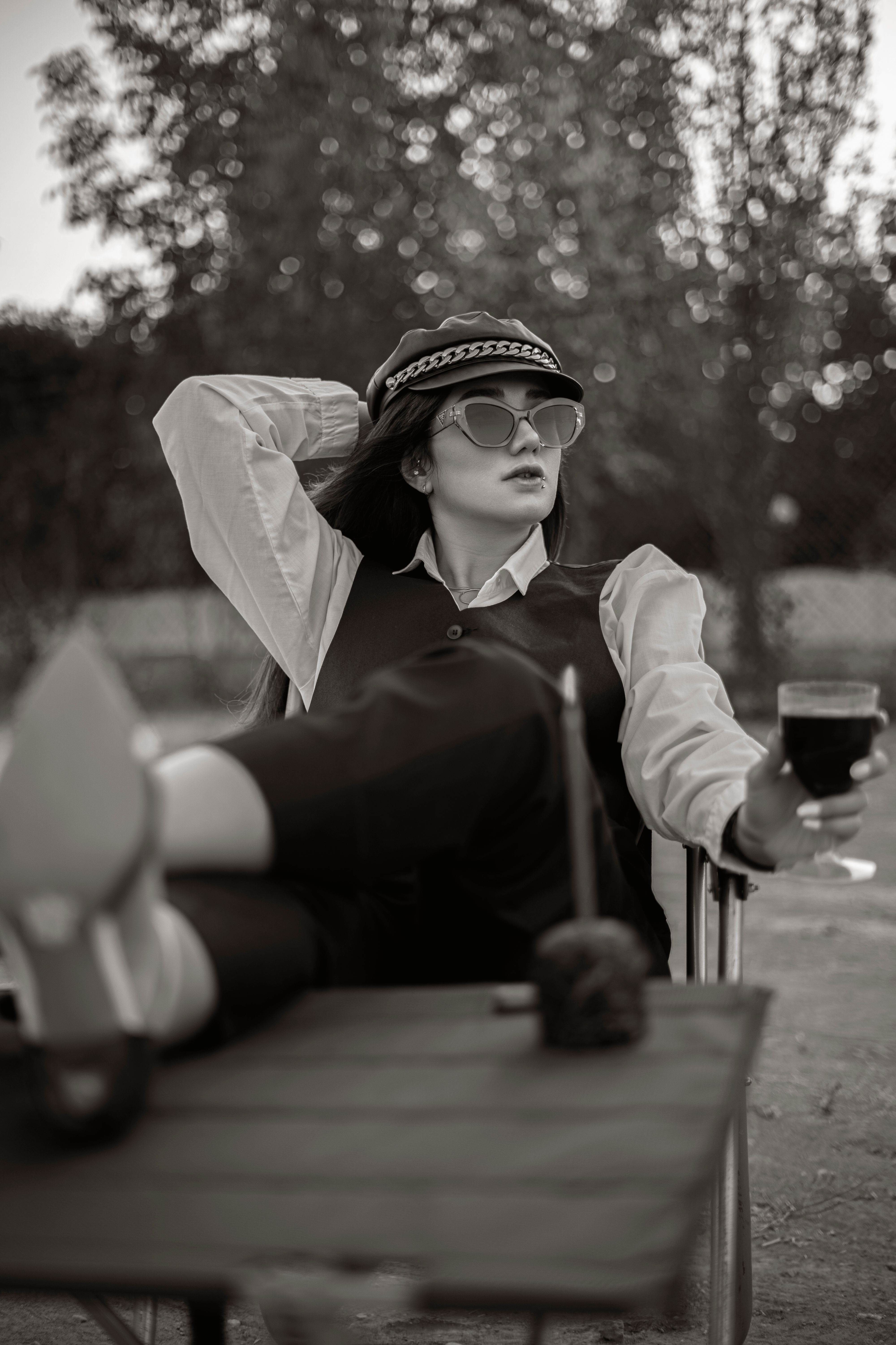 Woman Sitting with Legs on Table · Free Stock Photo