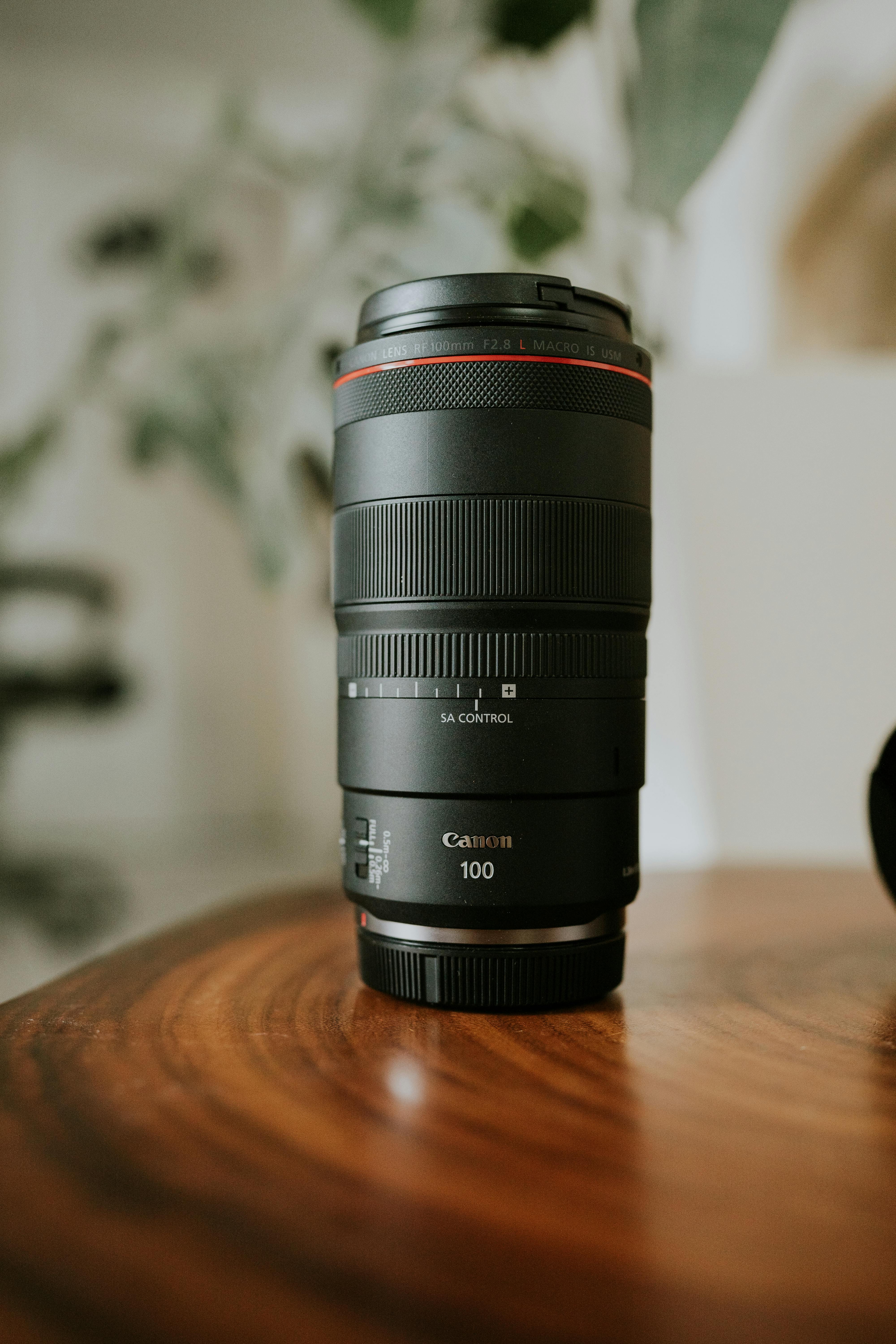 Camera Lens on Table · Free Stock Photo
