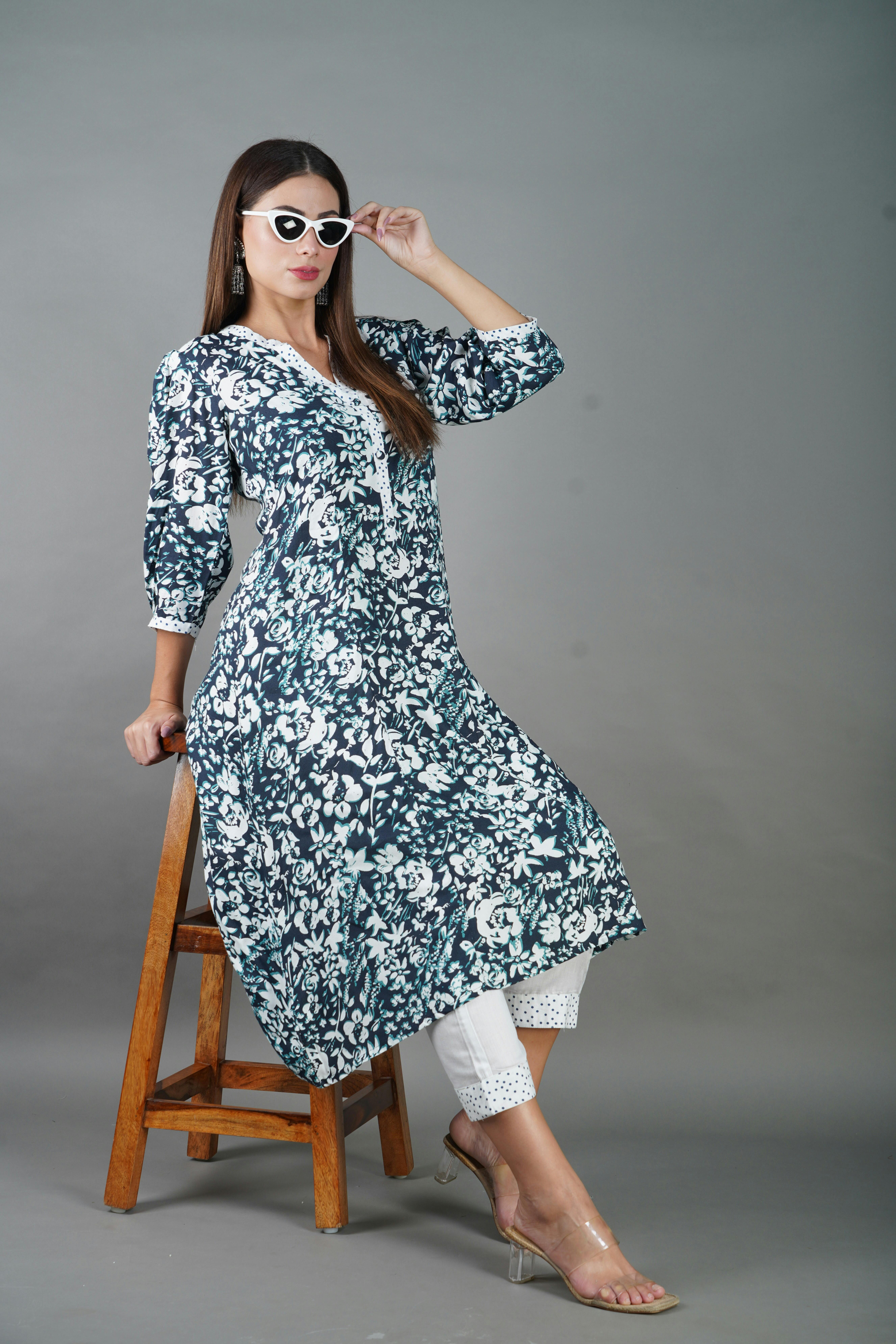 Women Wearing Patterned Dresses and Sunglasses · Free Stock Photo