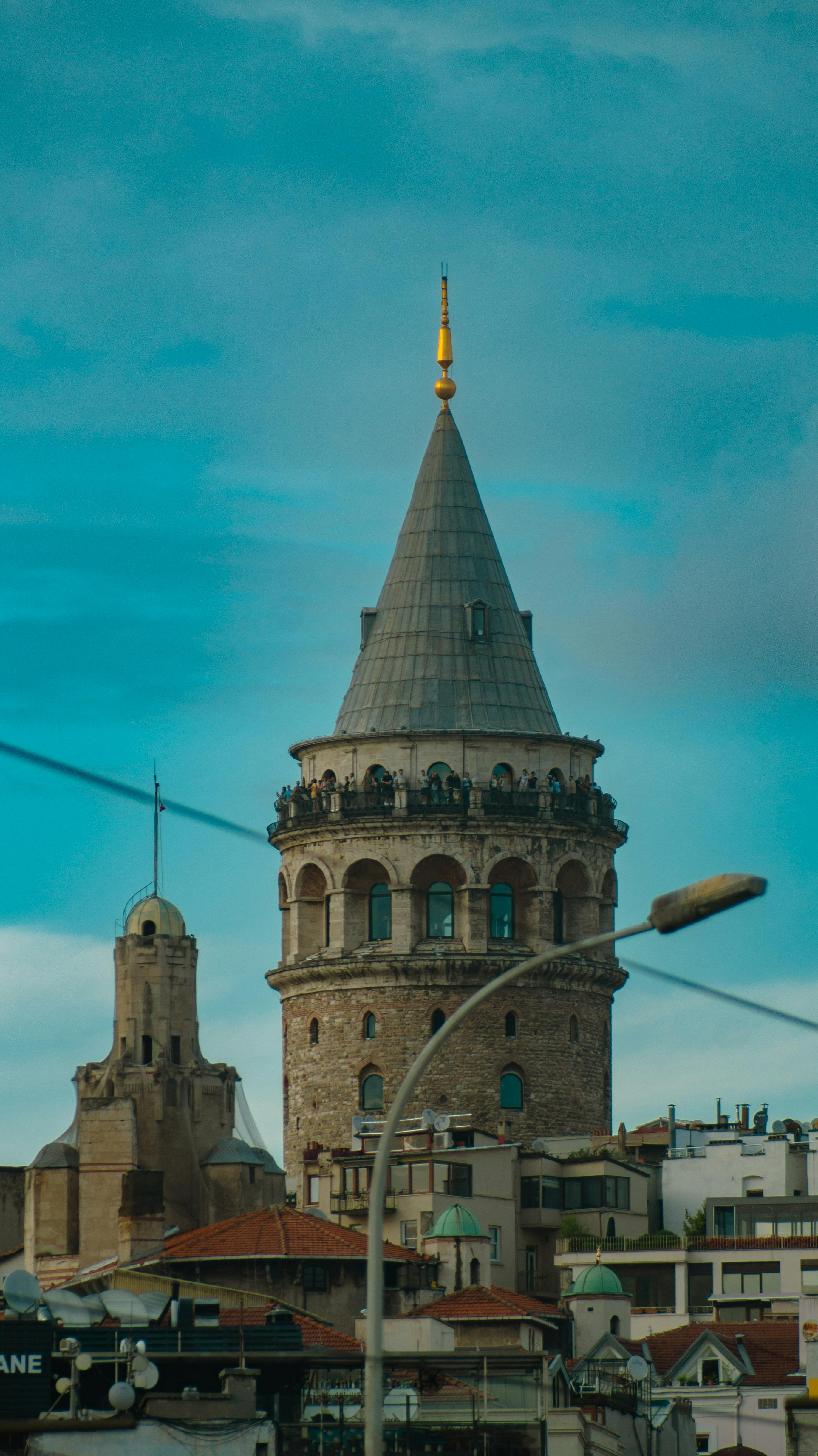 Galata Tower among Flags of Turkiye · Free Stock Photo