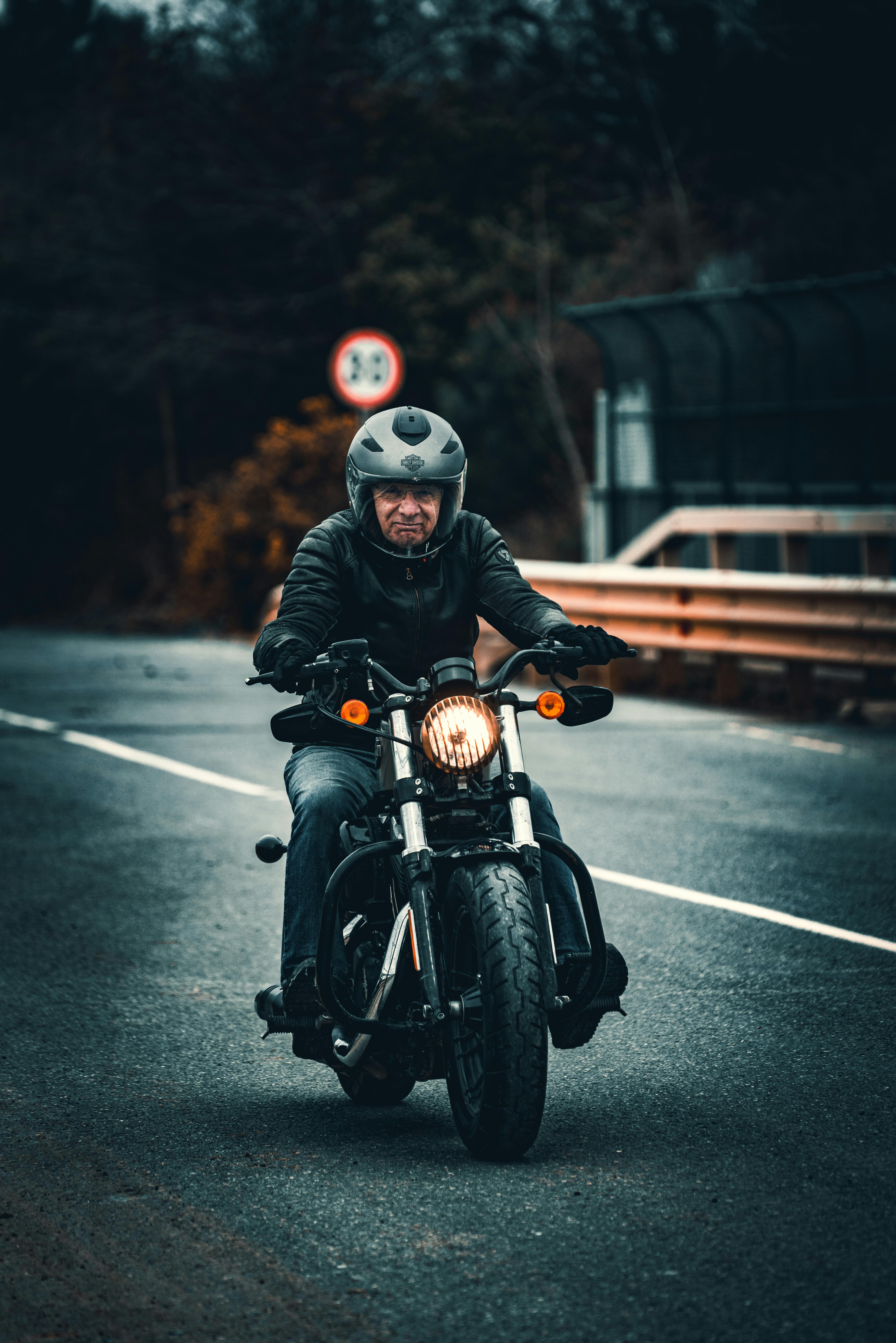 A Man Riding Motorcycle on the Road · Free Stock Photo