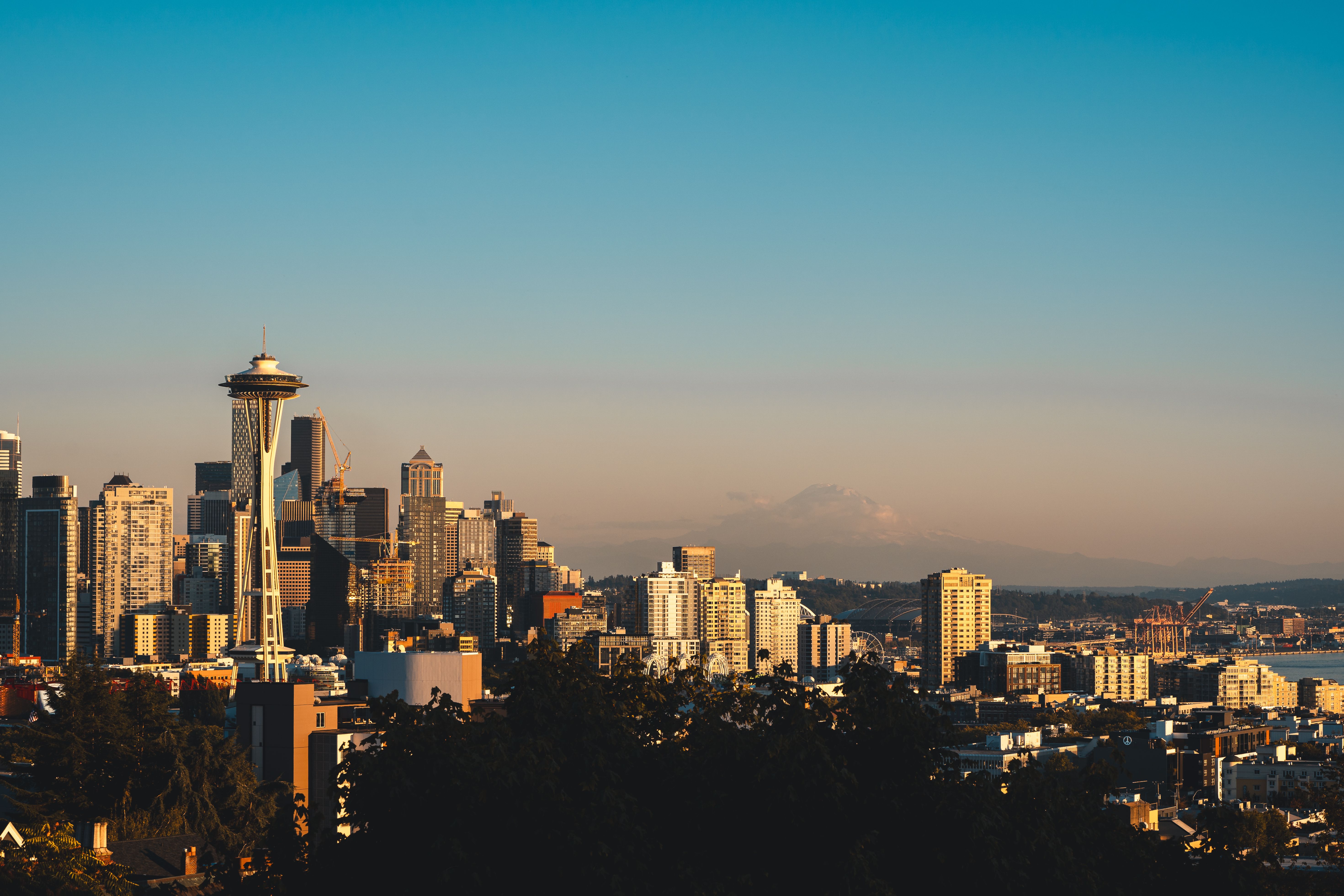 Cityscape of Seattle With Ship Sailing by · Free Stock Photo