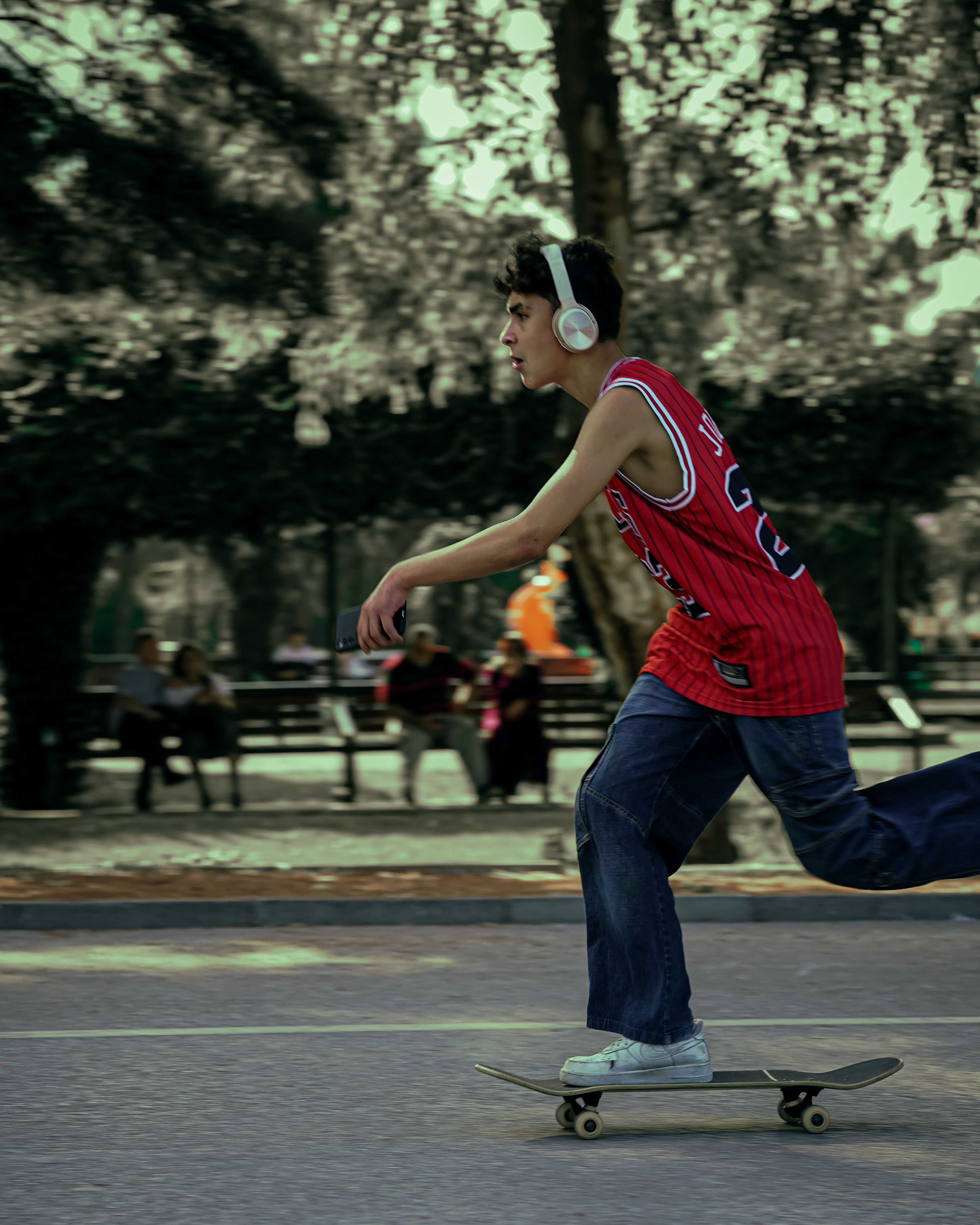 Man Skateboarding on Street by Park · Free Stock Photo