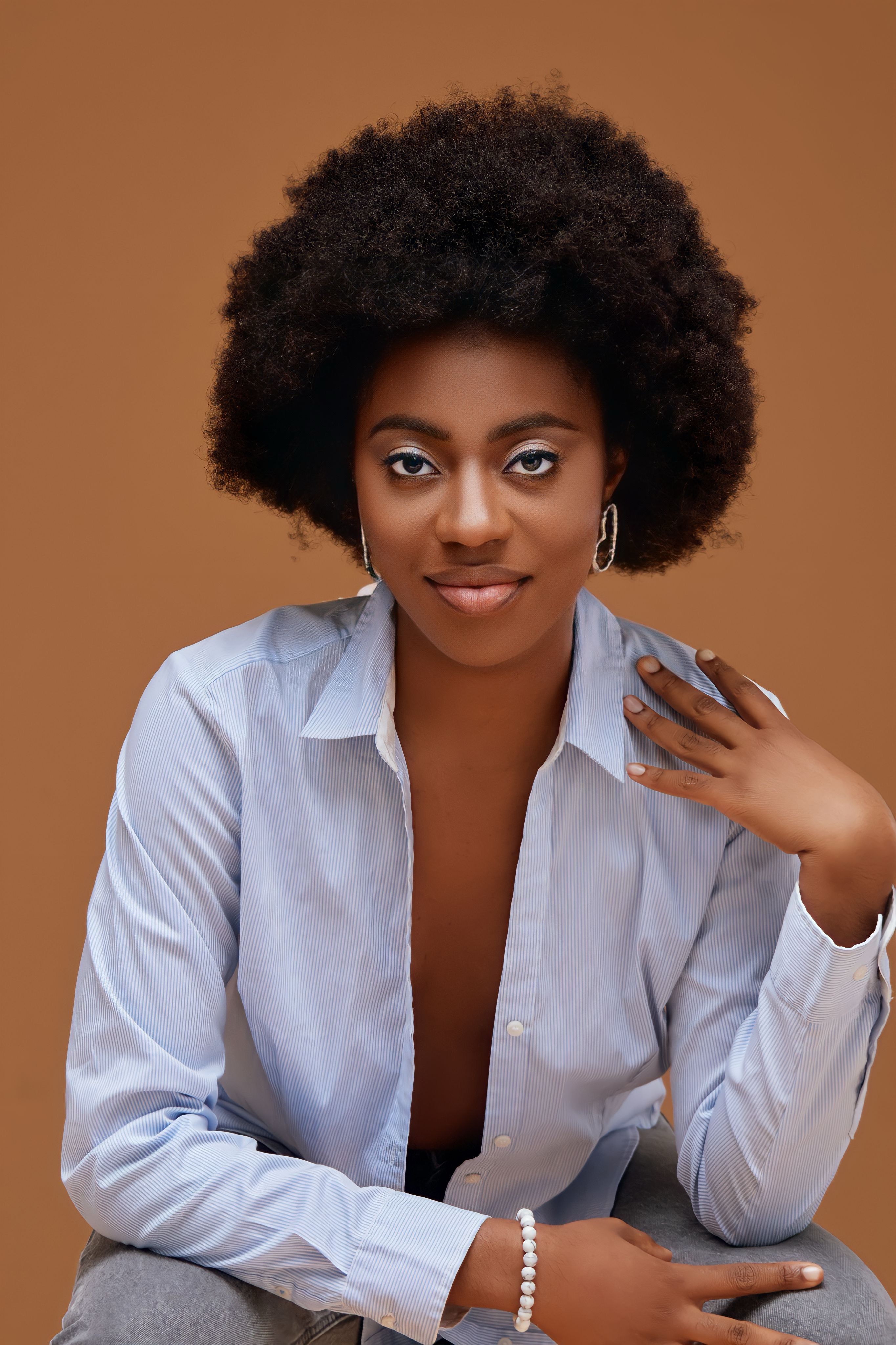 Woman Covering Stomach with Edge of White Shirt · Free Stock Photo