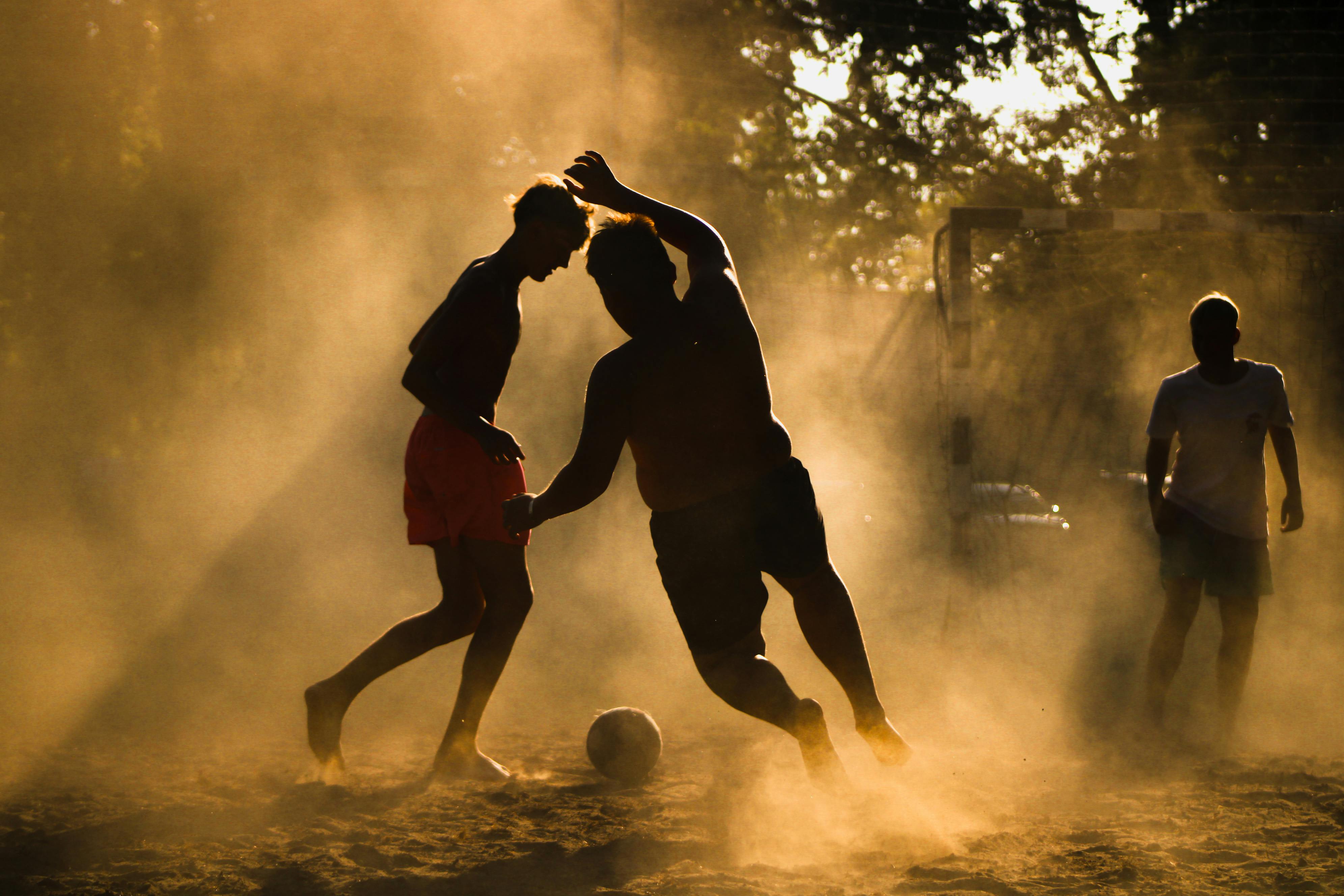 People Playing Ball in Grey Sound · Free Stock Photo