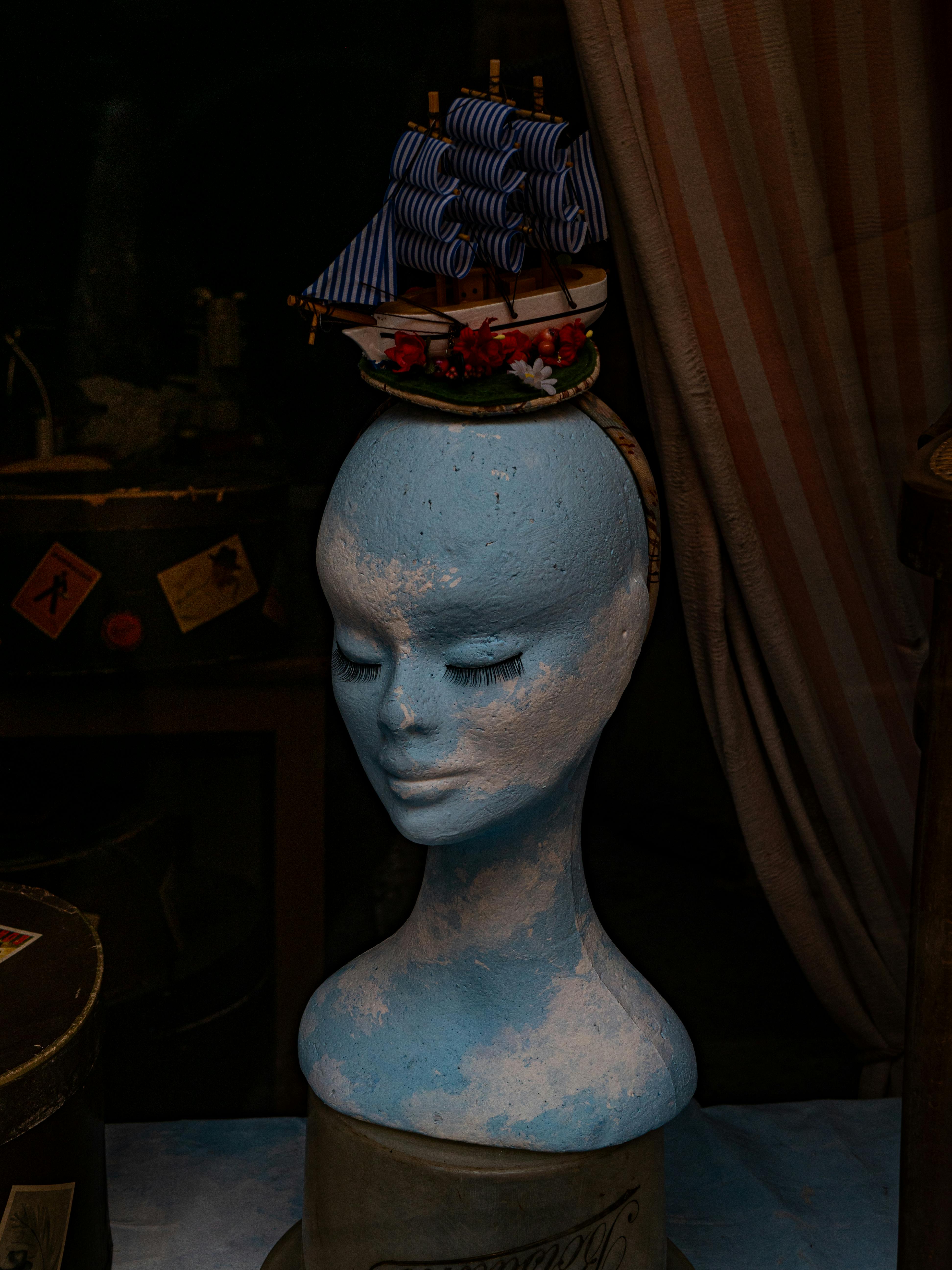 A Bust with a Ship on the Head · Free Stock Photo