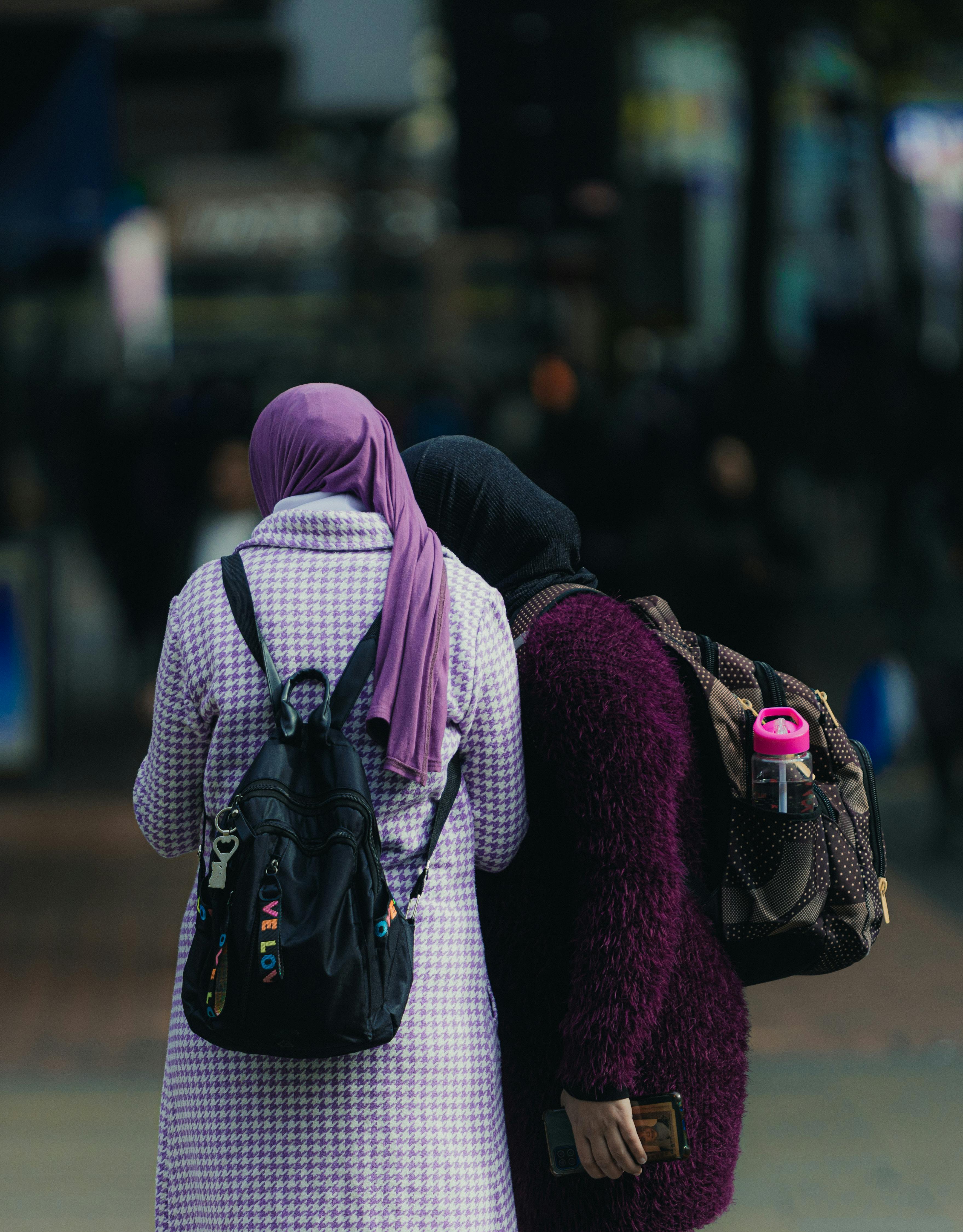 Women in Hijabs and with Backpacks · Free Stock Photo