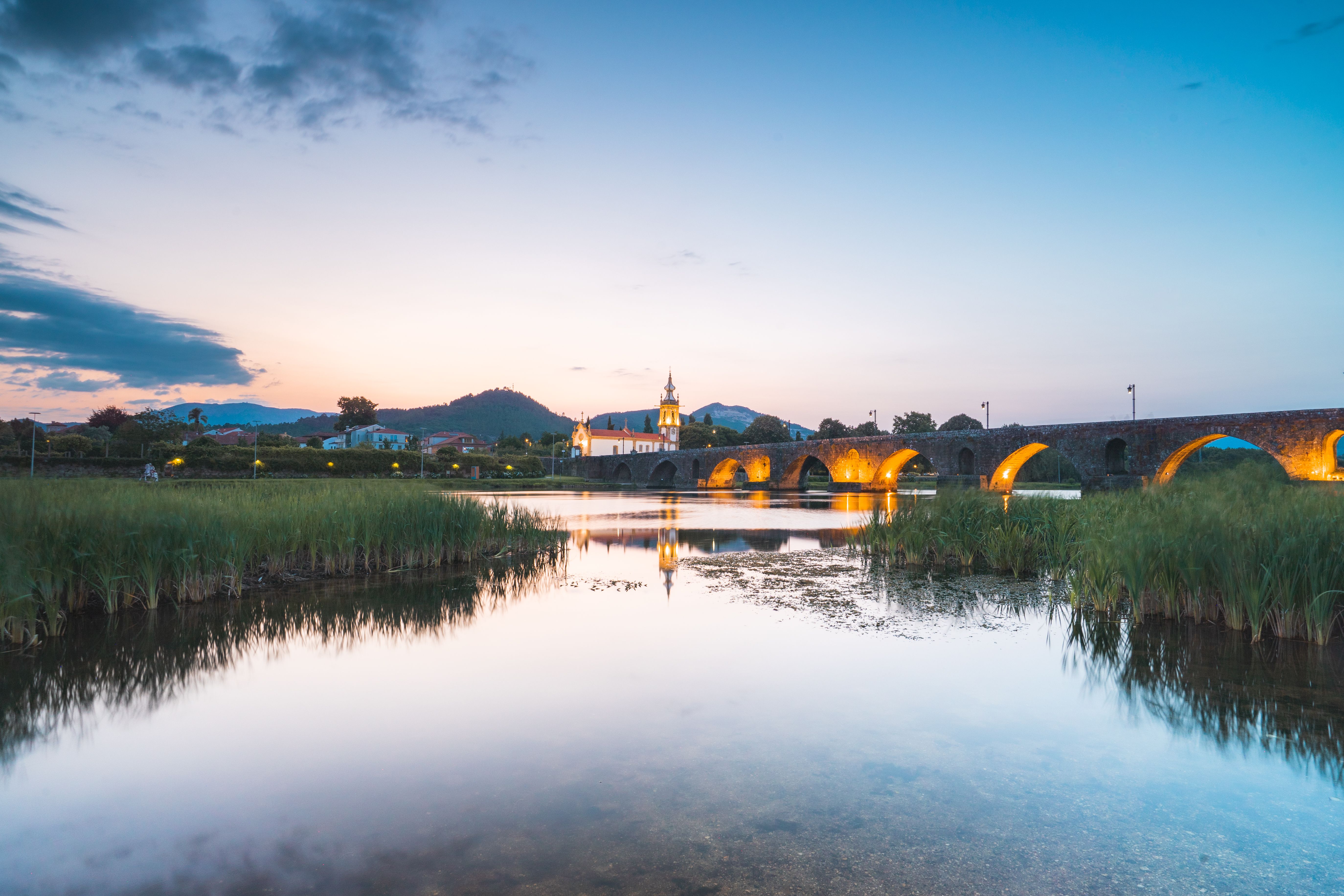 Evening at the medieval bridge at Ponte de Lima, Portugal. · Free Stock ...
