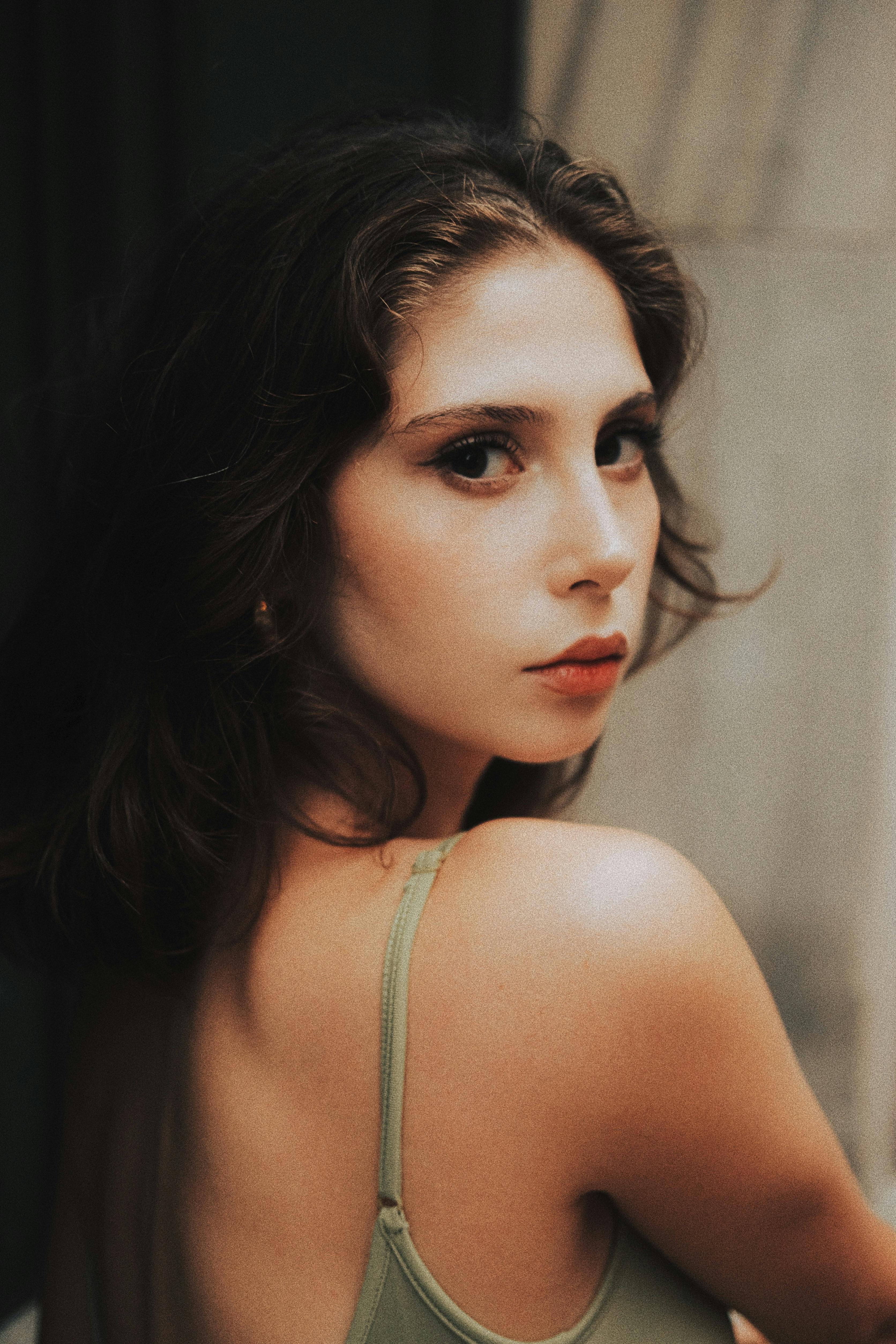 Face of Woman Looking Back · Free Stock Photo