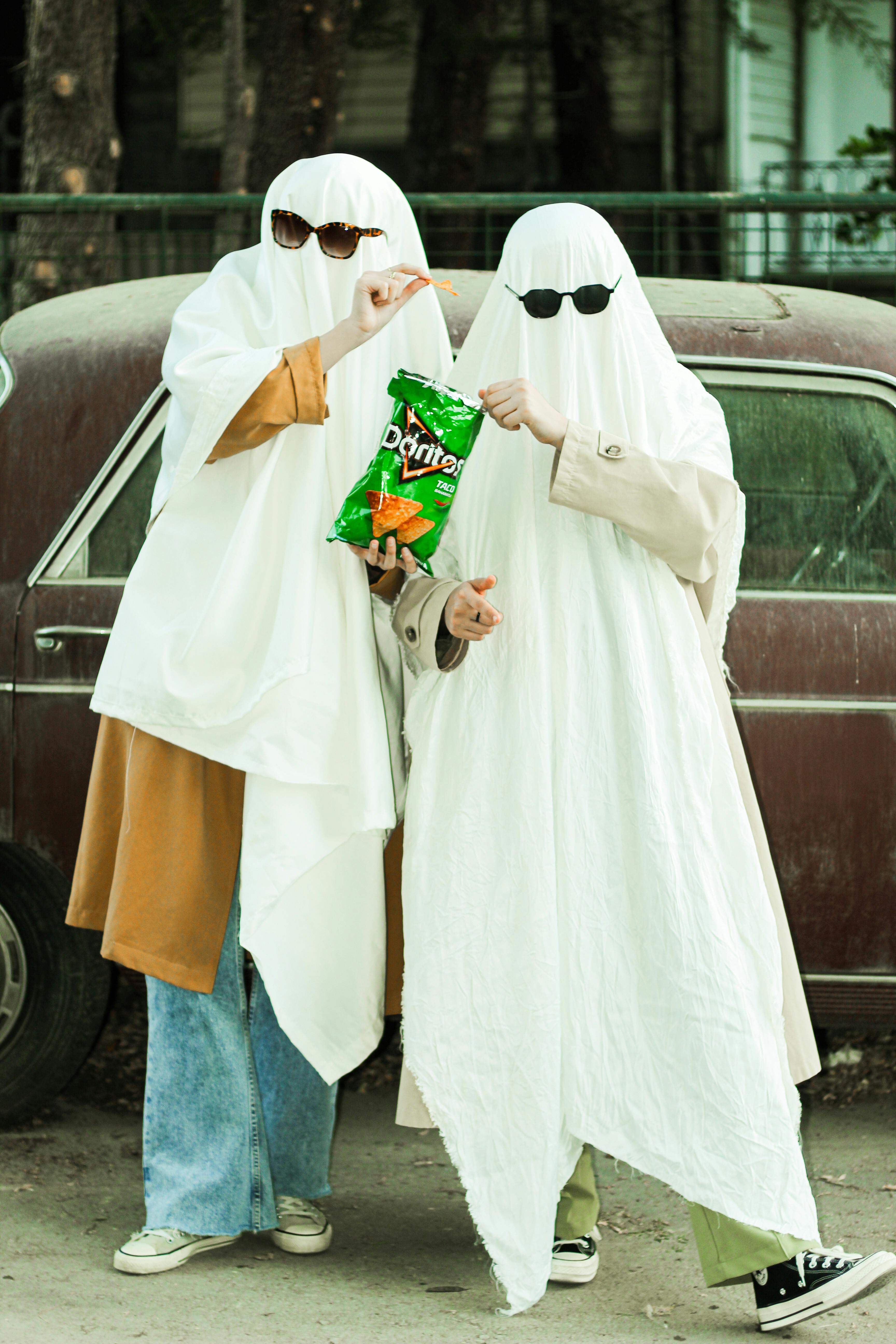 Chosts in Sunglasses and with Doritos Chips · Free Stock Photo