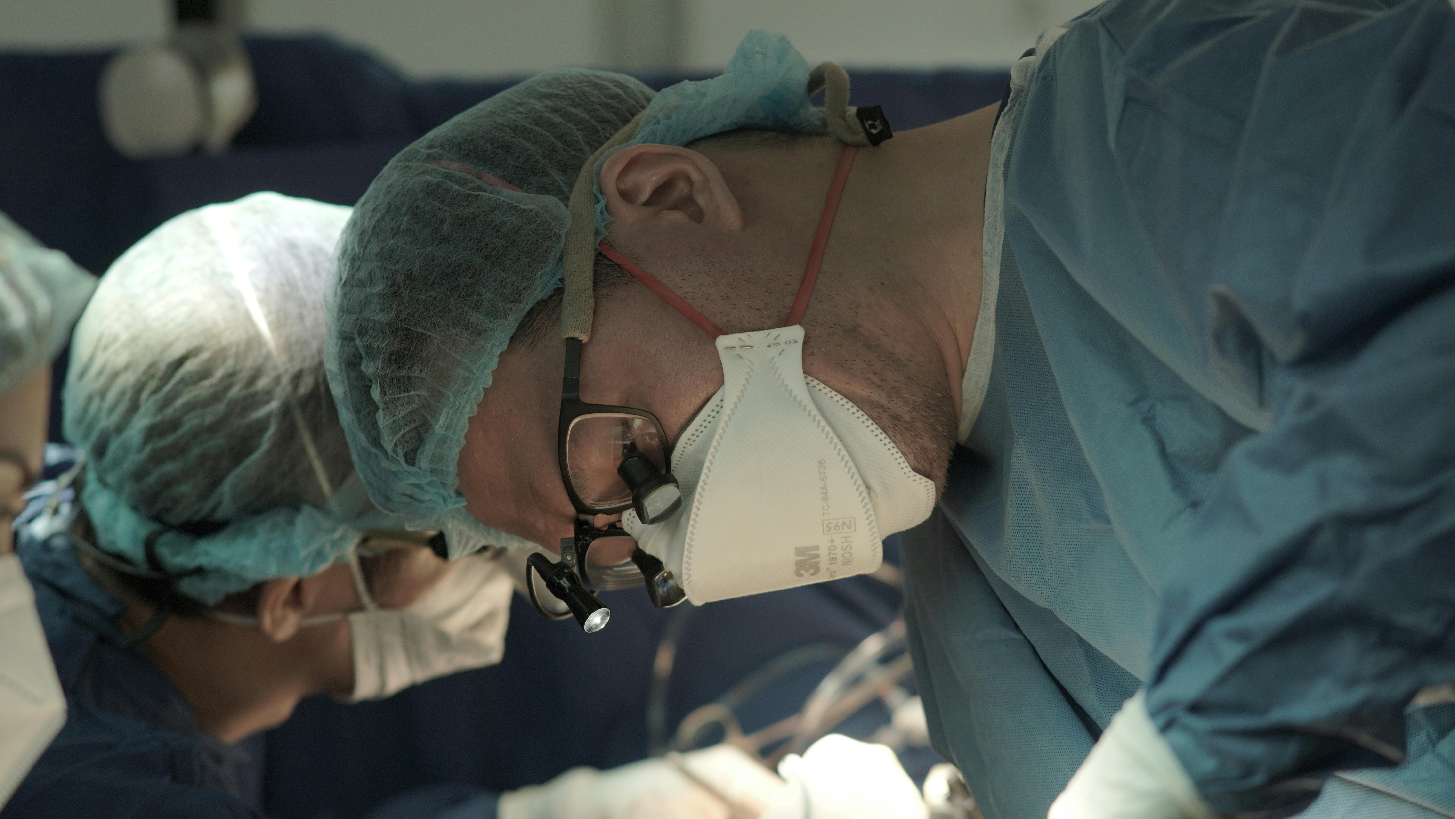 Surgeons Operating on a Patient · Free Stock Photo