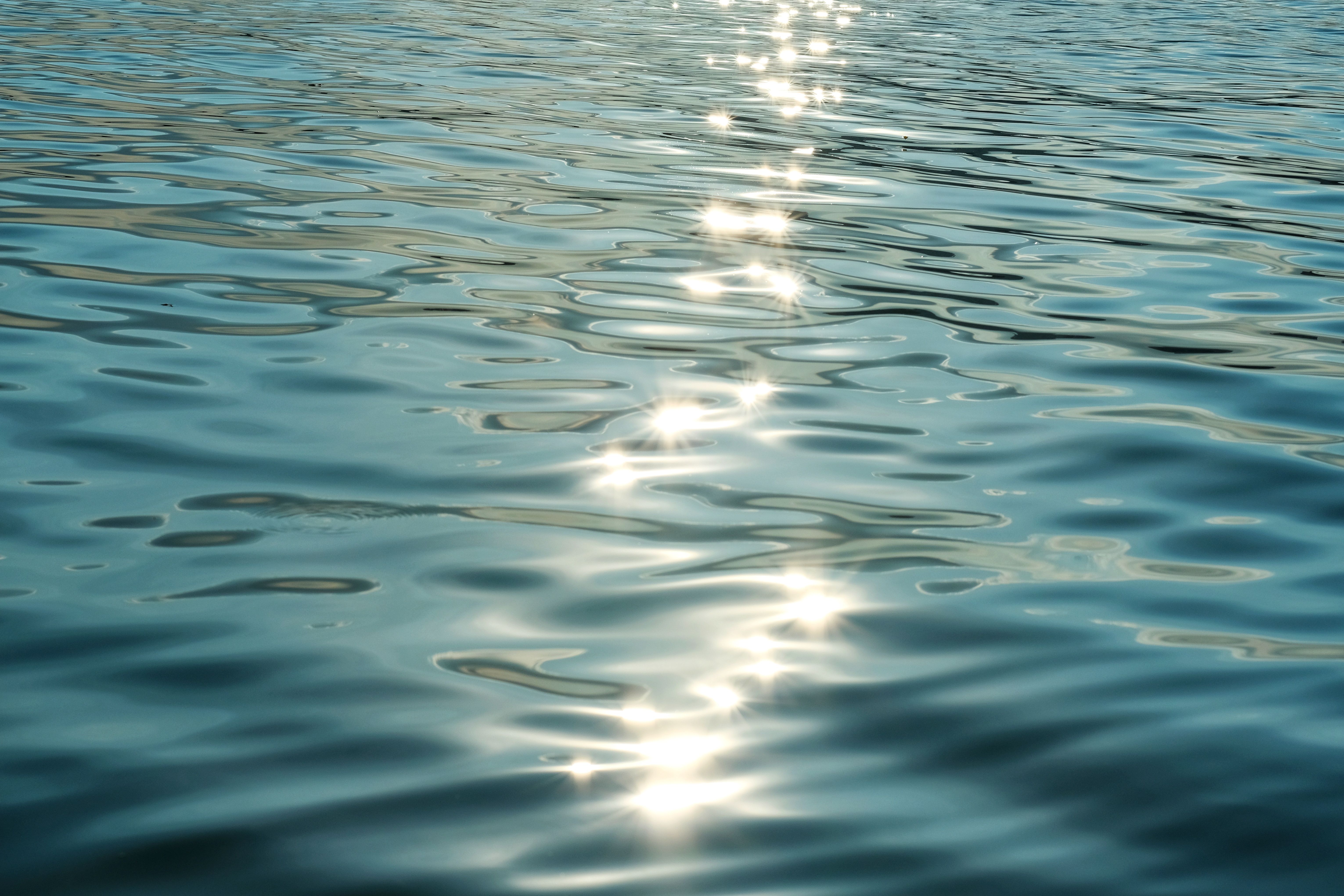 Sun Shining on Water Surface · Free Stock Photo