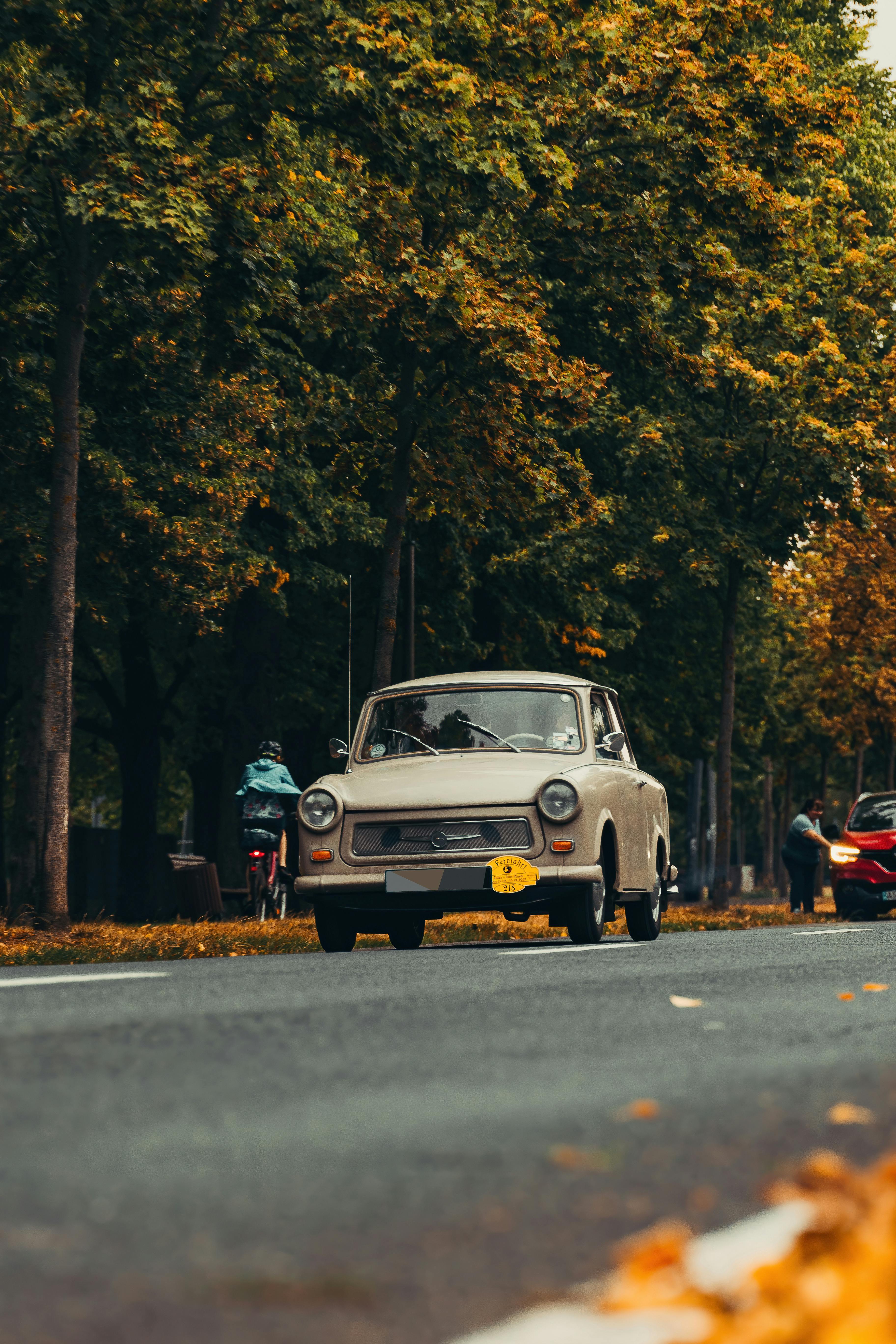 Old Fashioned Car on Road · Free Stock Photo