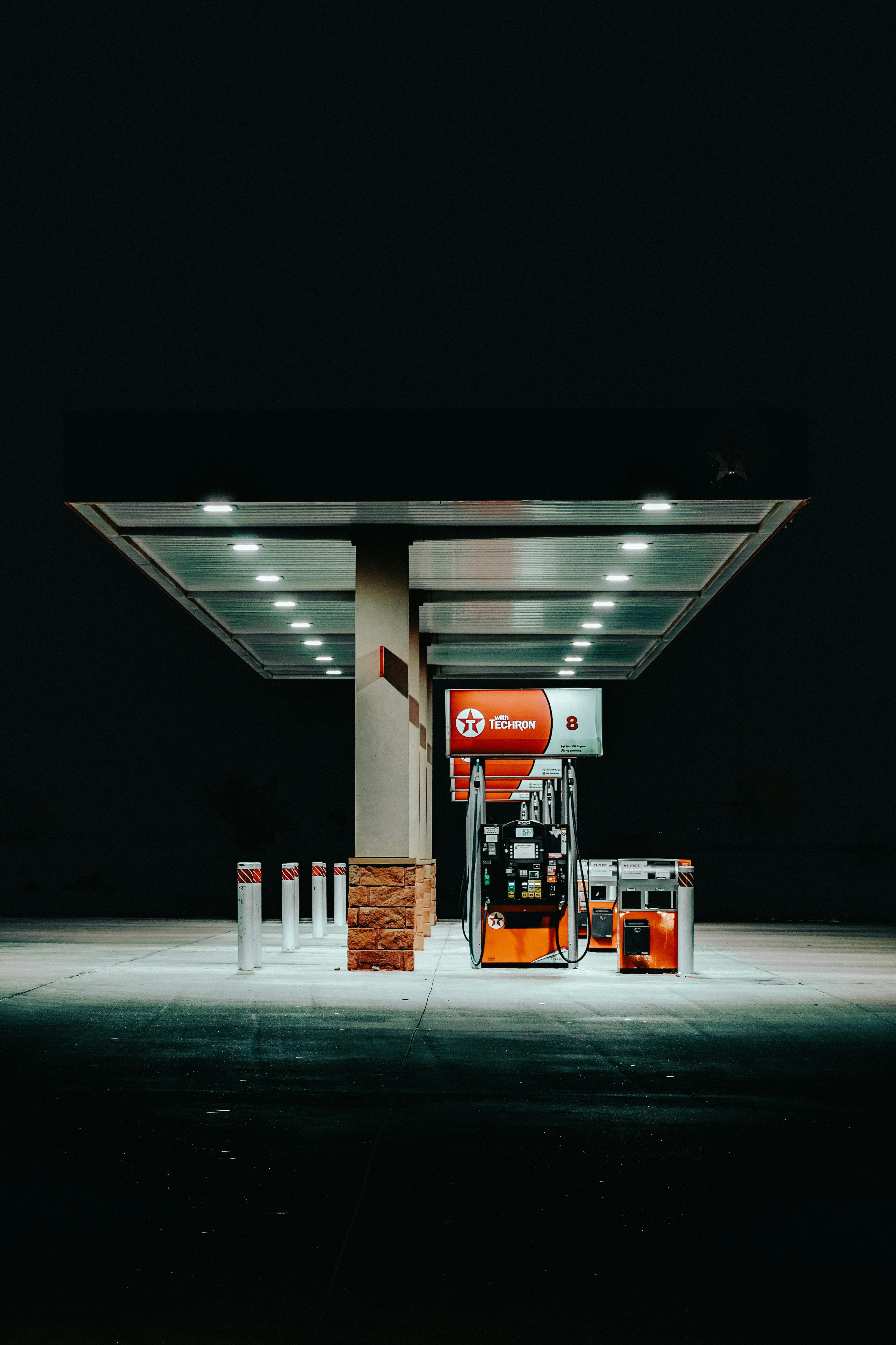 Grayscale Photo of a Gas Station · Free Stock Photo