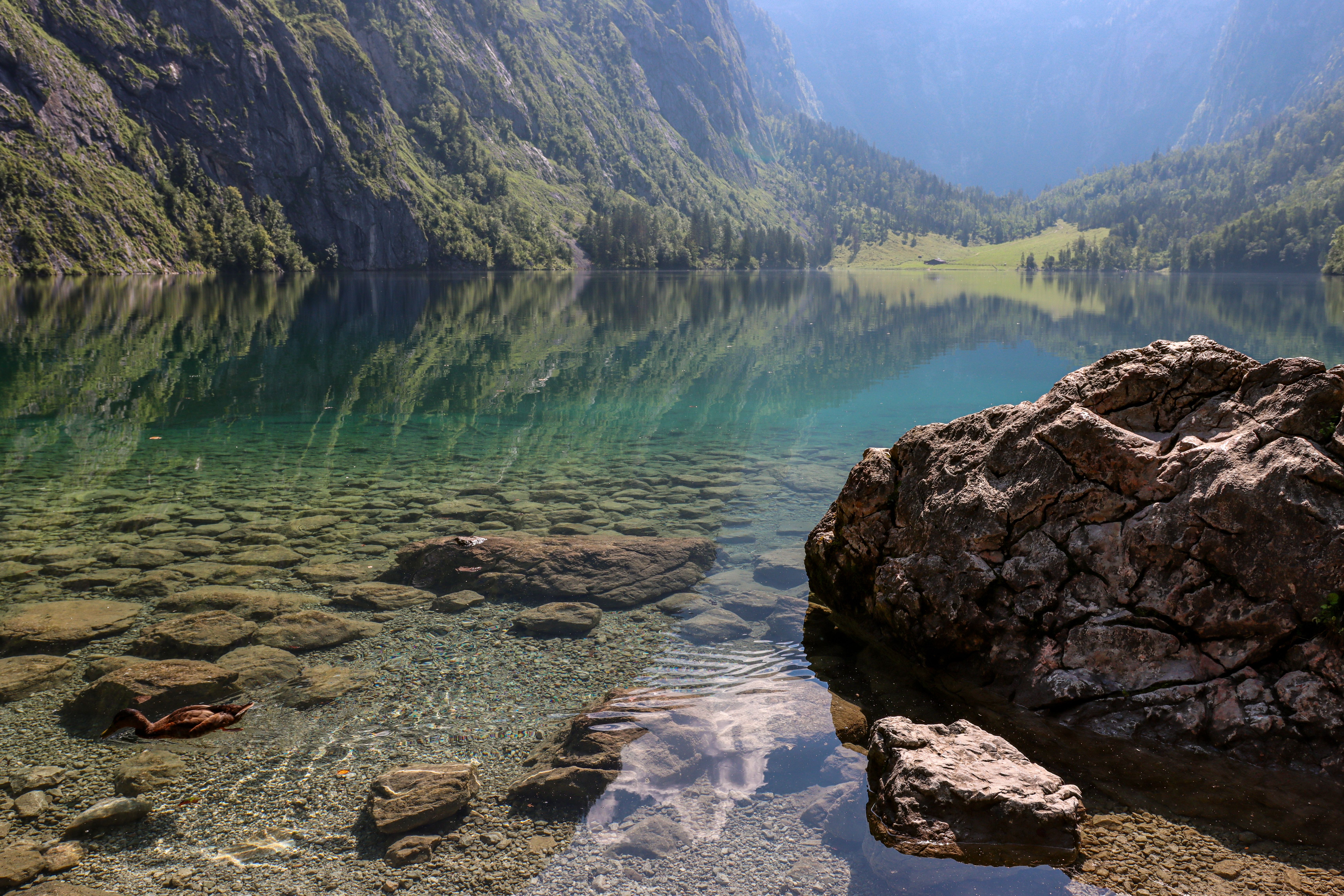 Rock on Shallow Lakeshore in Mountains · Free Stock Photo