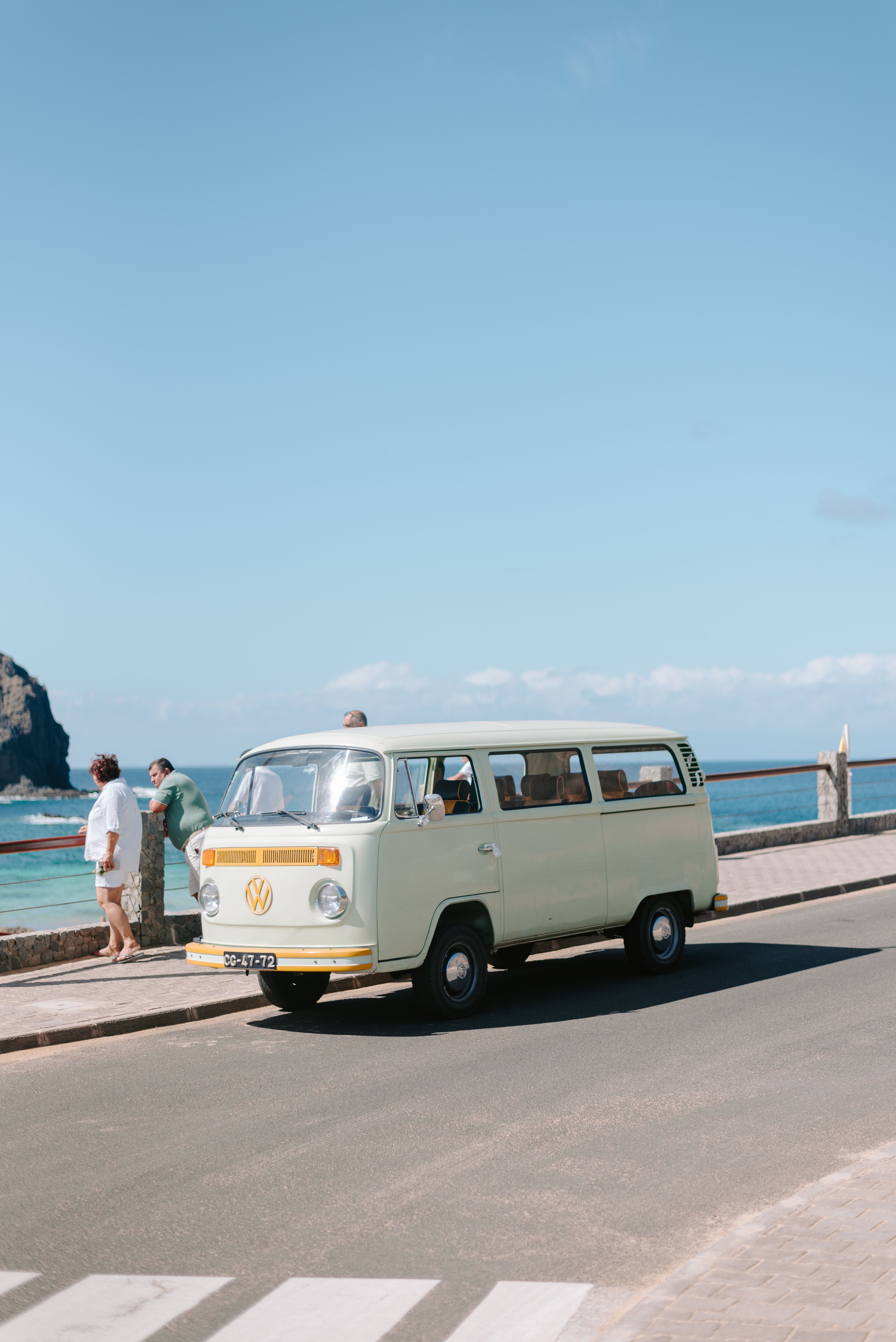 Van Parked Beside the Road Near Handrail and Ocean · Free Stock Photo