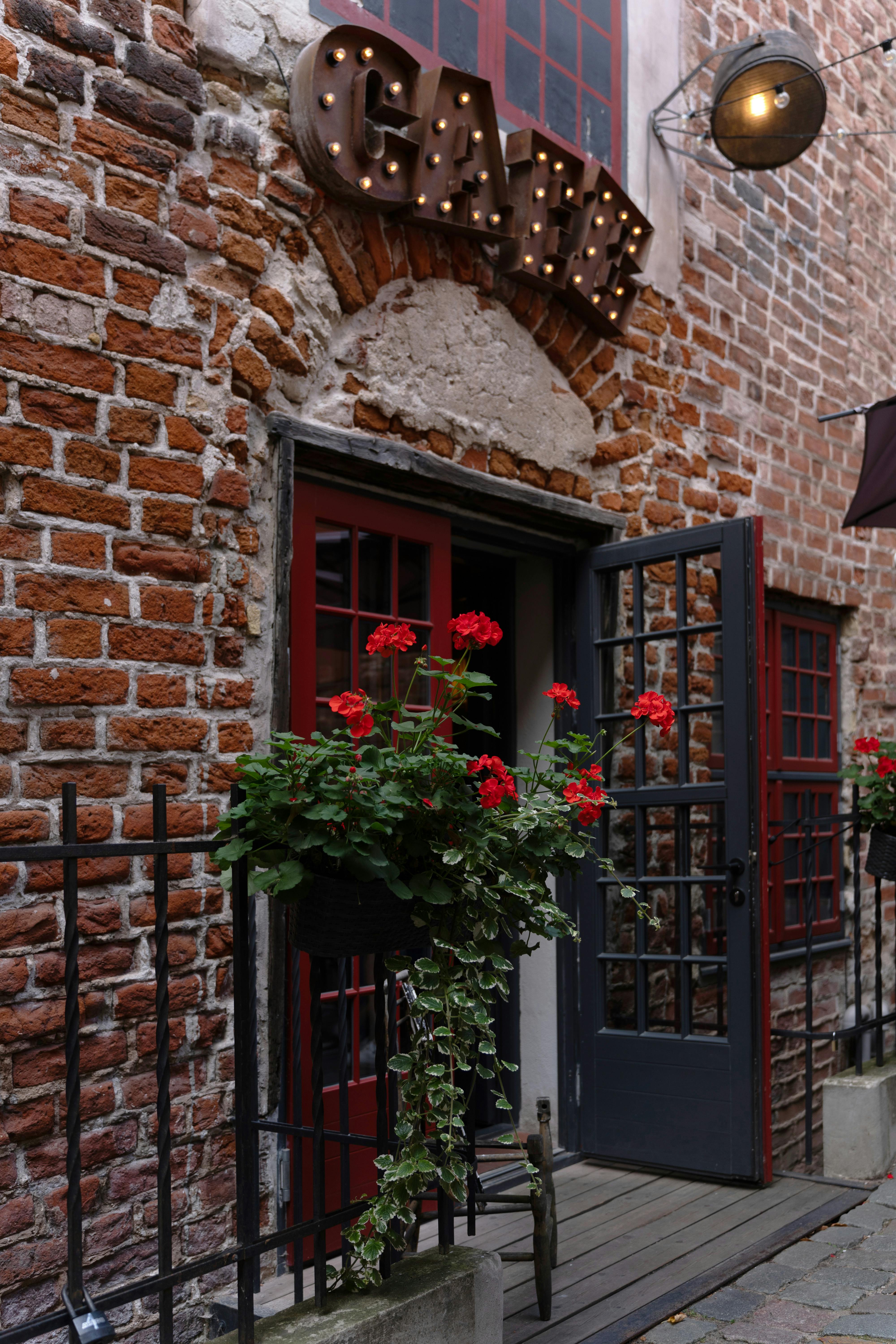 Green Door With White Wall · Free Stock Photo