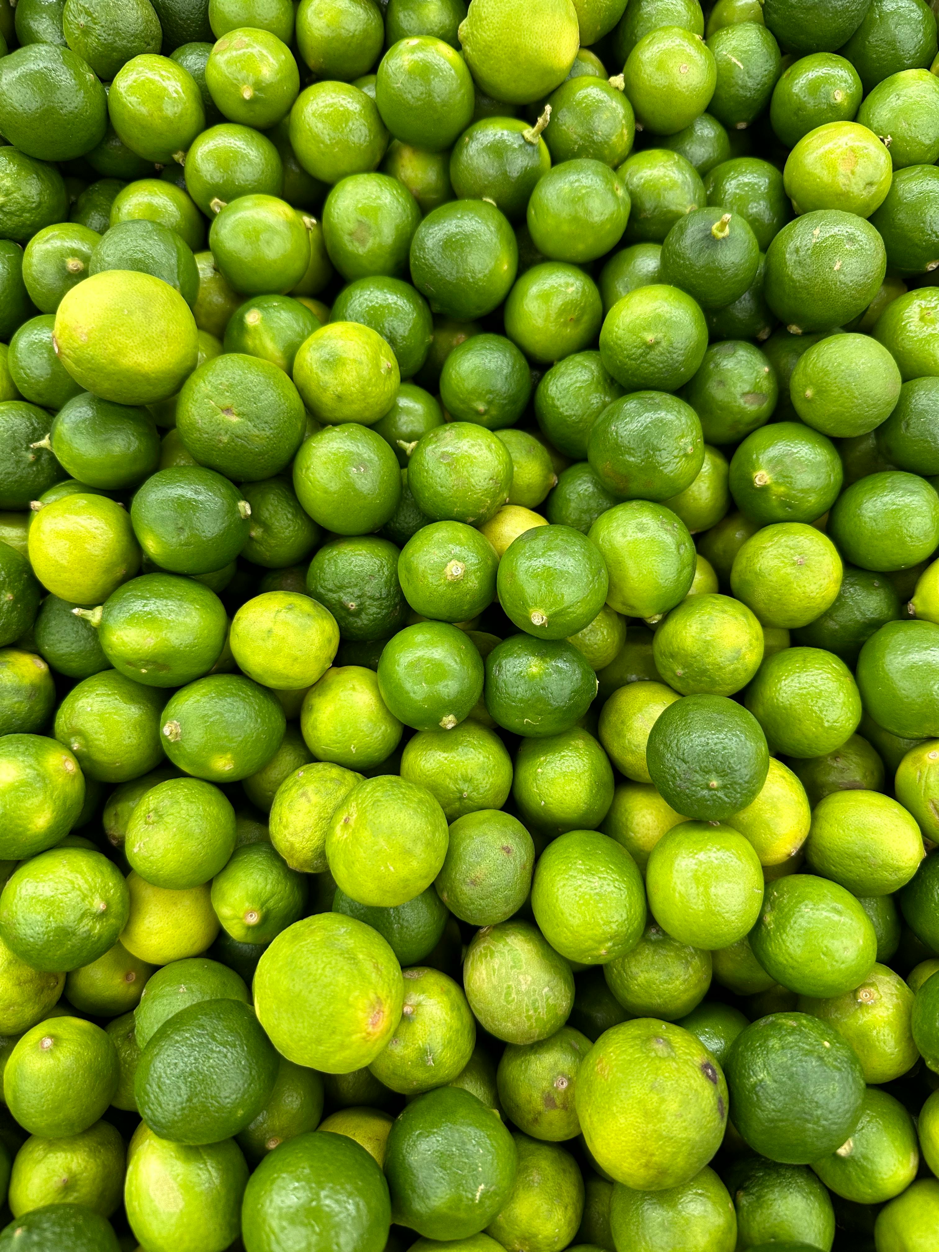Pile of Lime Fruits · Free Stock Photo