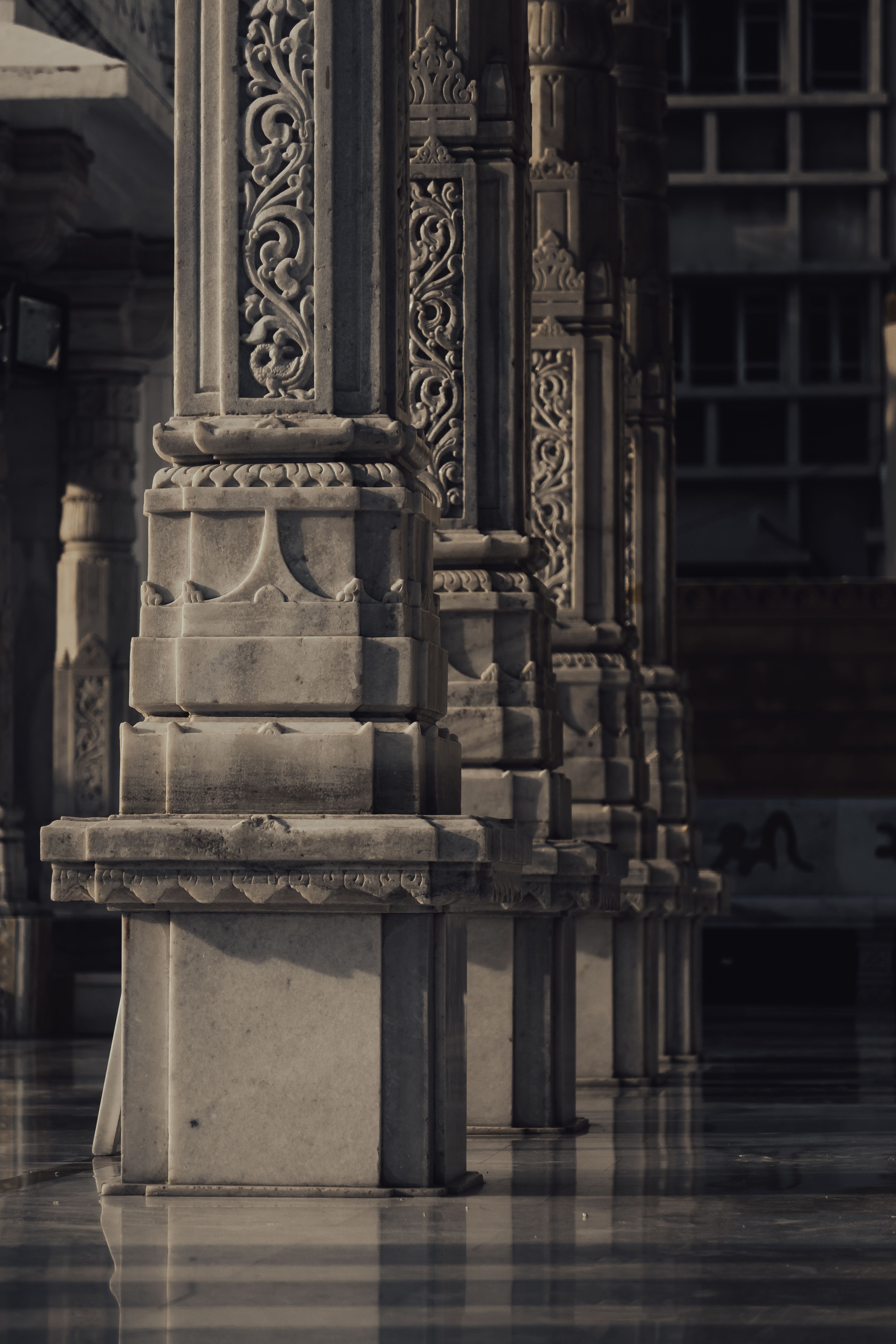 People Standing on Mezzanine with Columns · Free Stock Photo