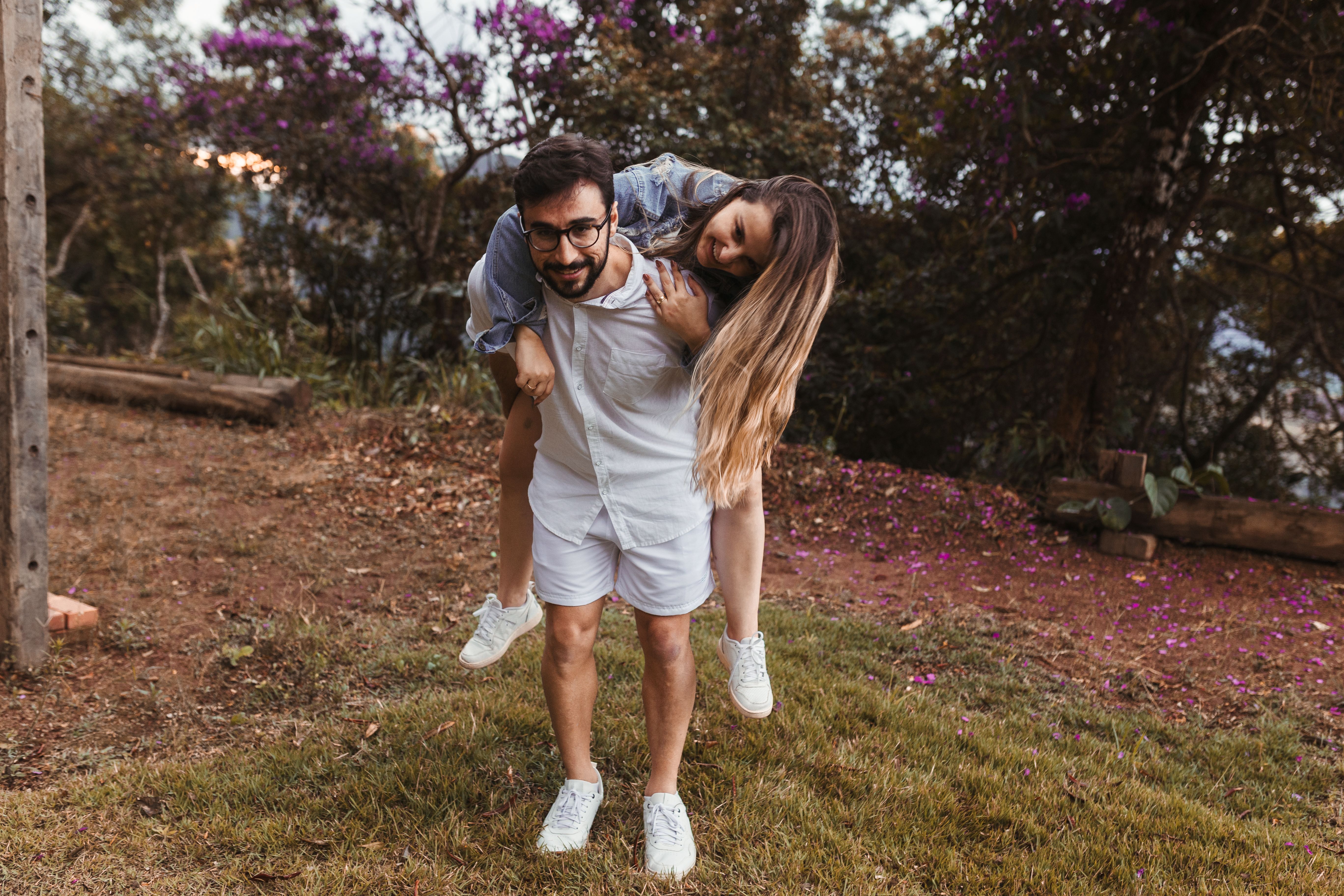 Smiling Man Carrying Woman · Free Stock Photo