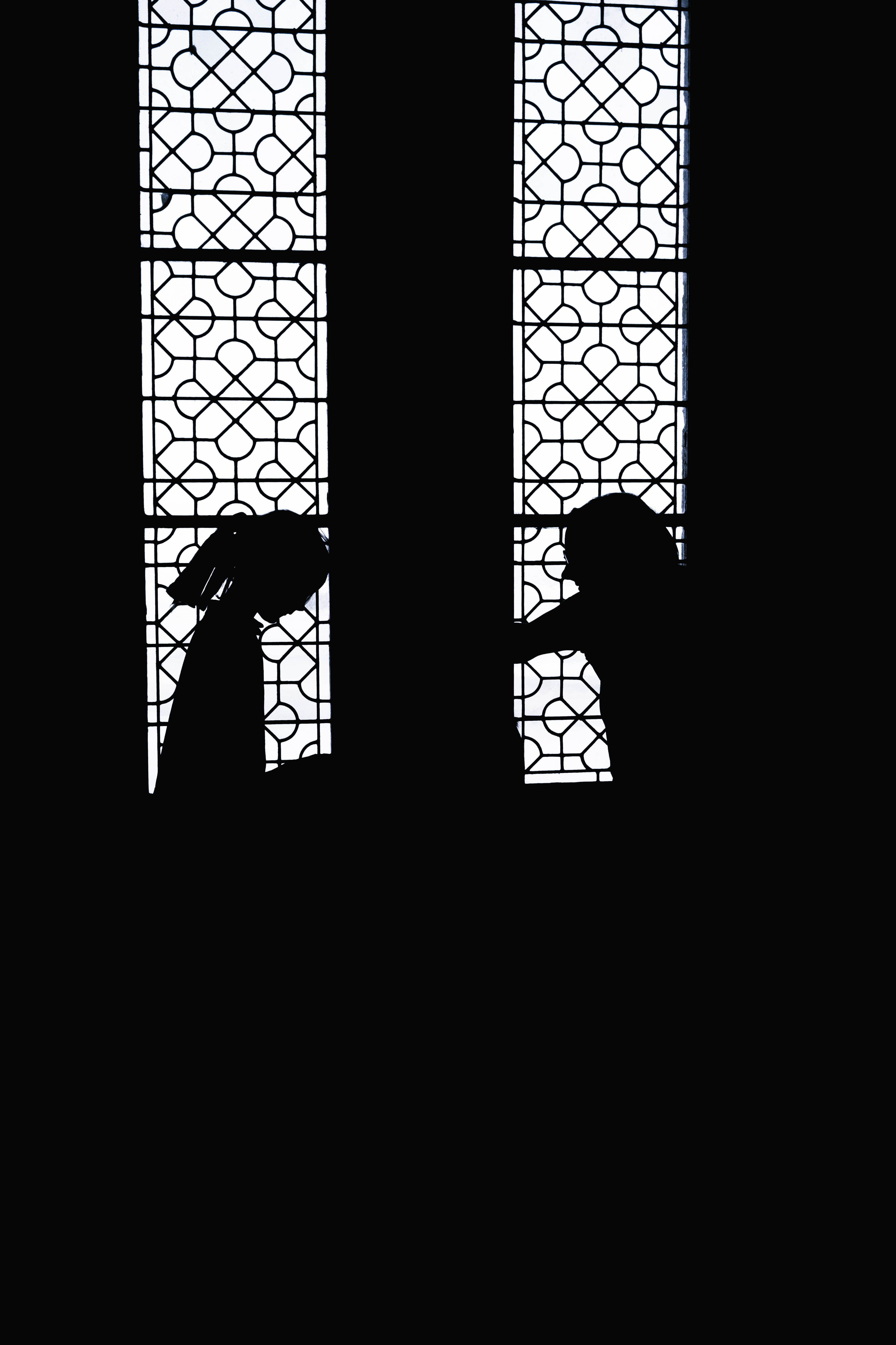 Woman and Man Silhouette in Darkness in Church · Free Stock Photo