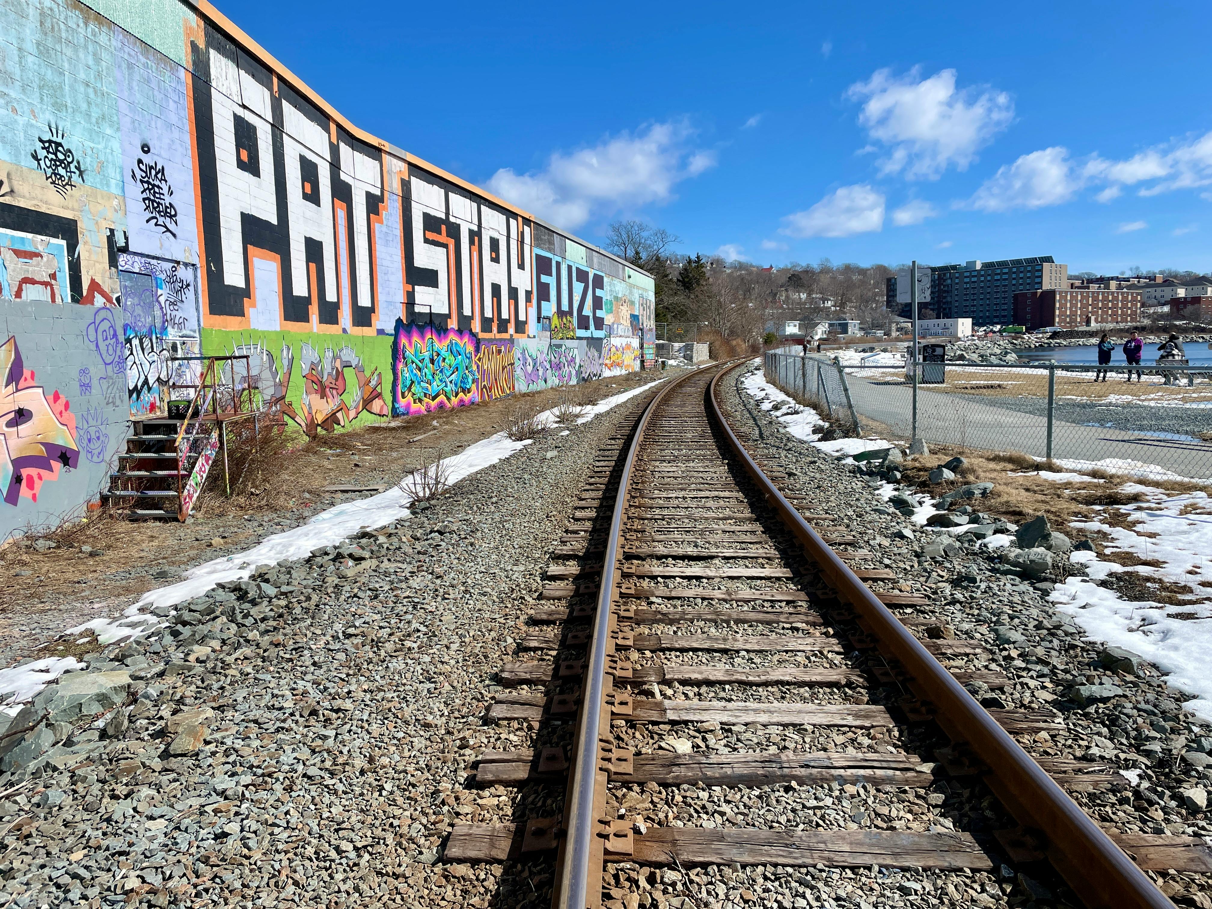 Graffiti by the Tracks · Free Stock Photo