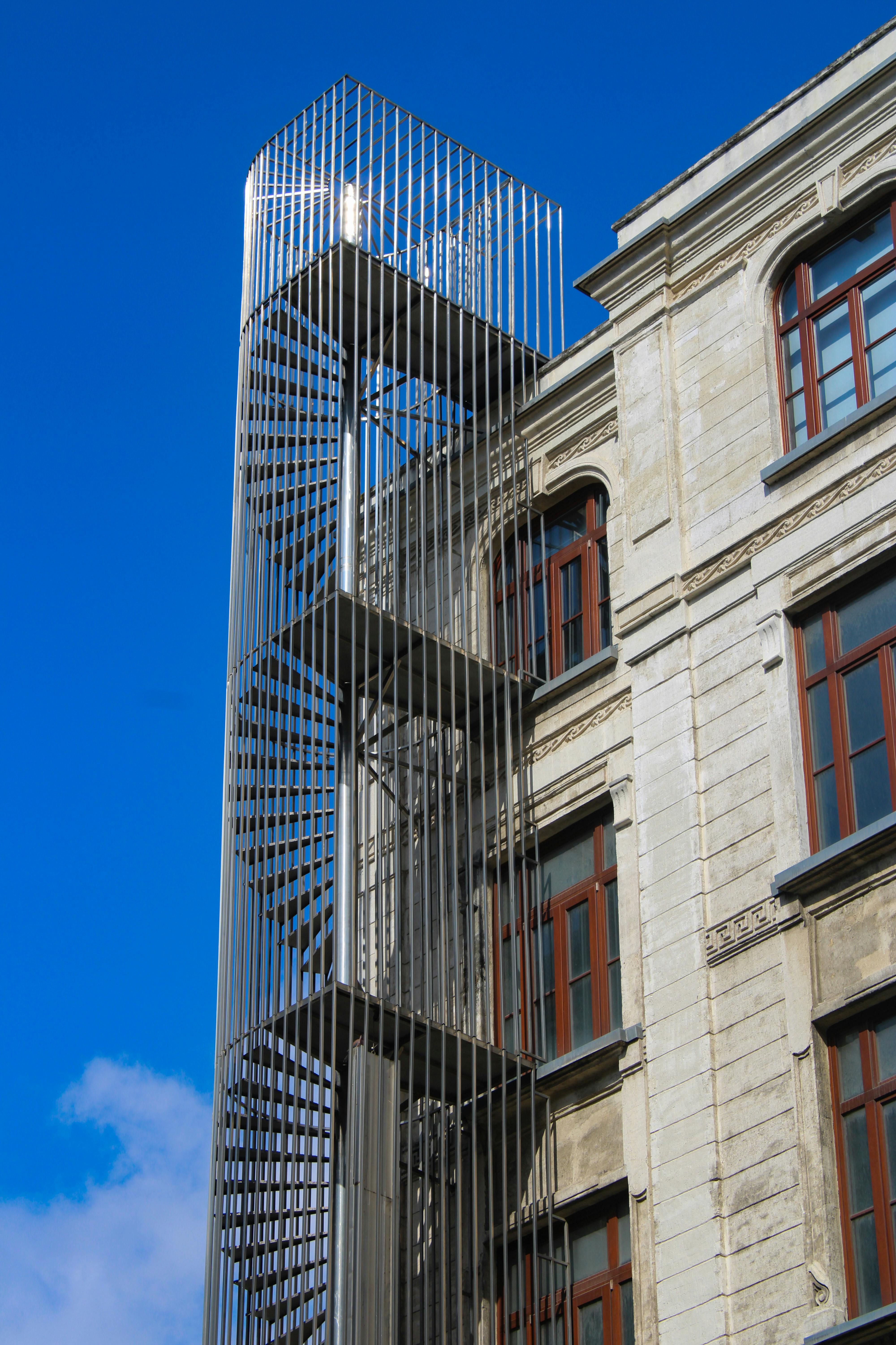 Stairs in Cage on Building Wall · Free Stock Photo