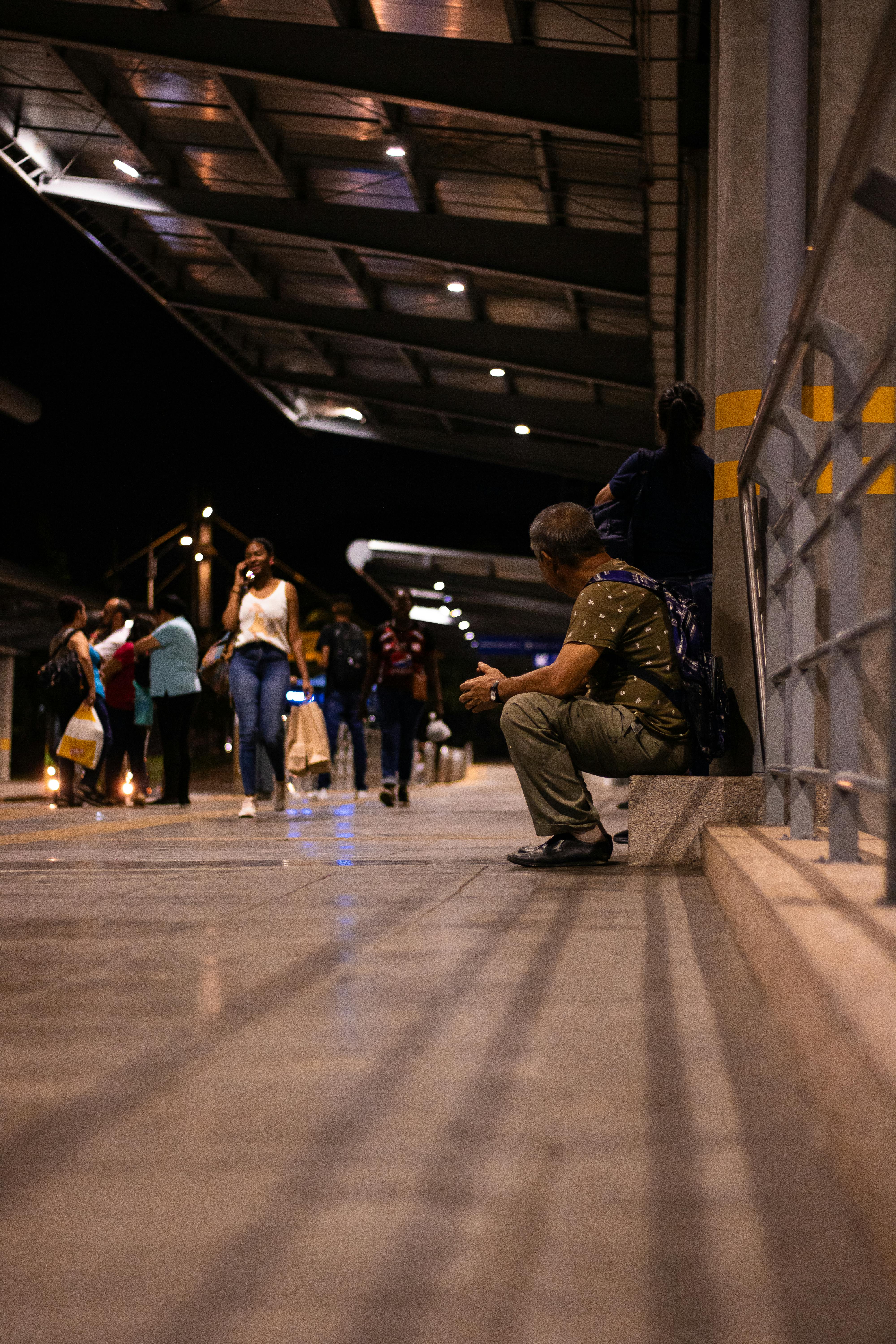 People Walking on a Platform at the Station · Free Stock Photo